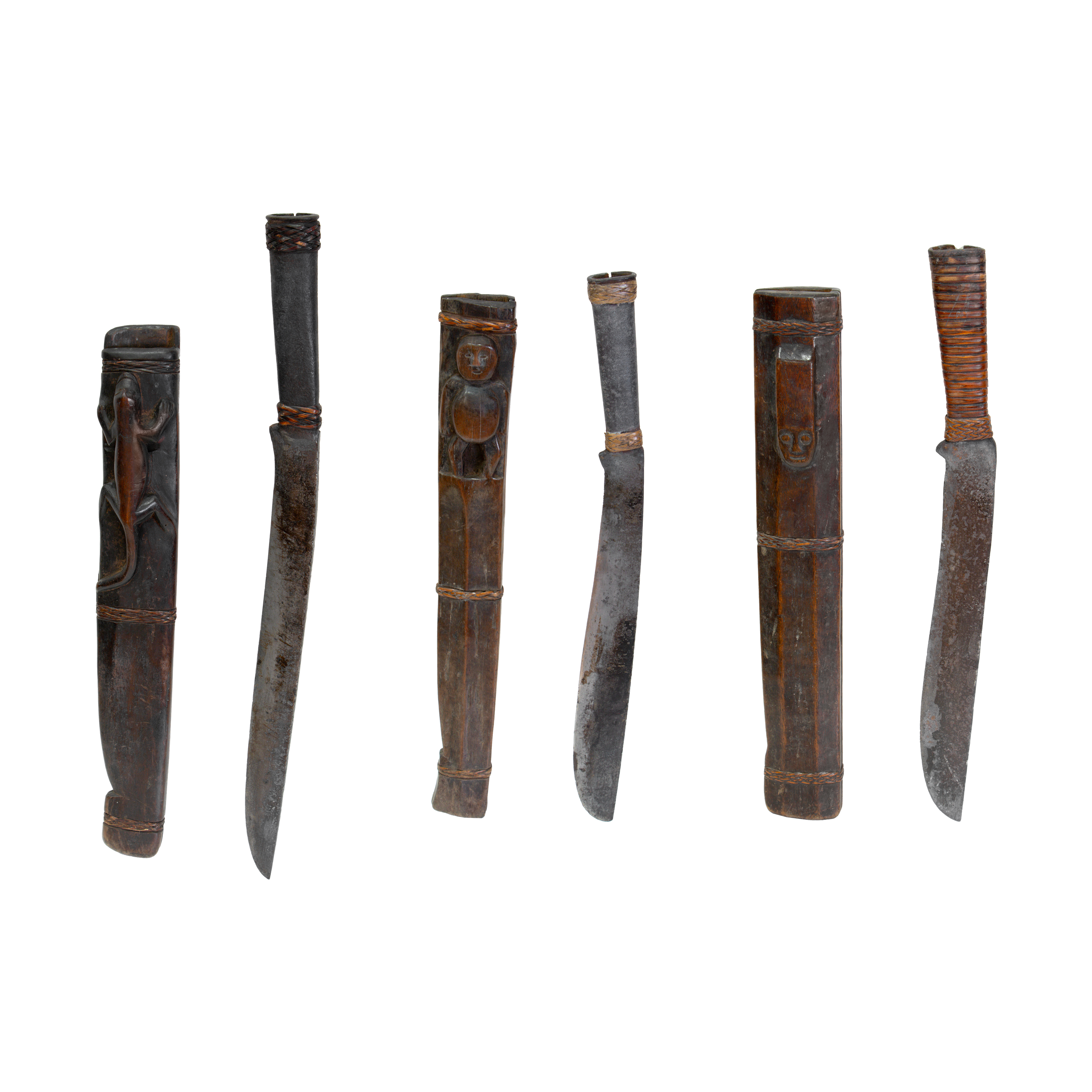 - A lot of 3 Ifugao daggers or bolo with hand-carved wooden sheaths
