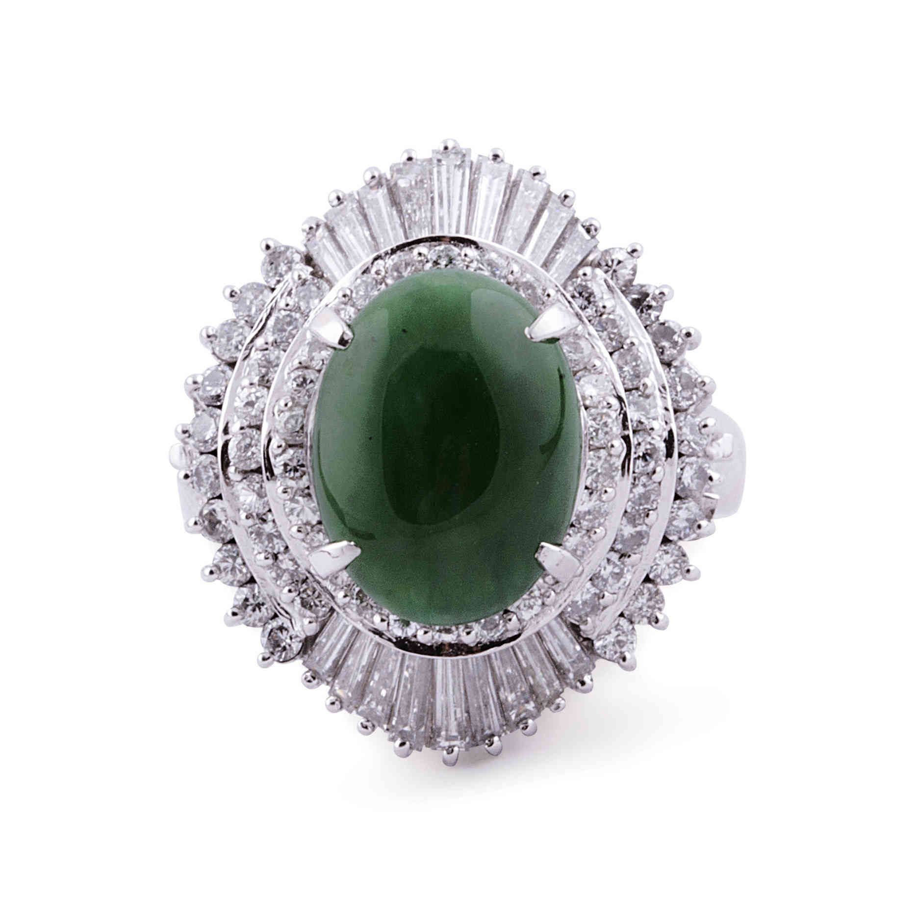 Jade and diamond ring - Centring on an oval cut cabochon jade ring ...