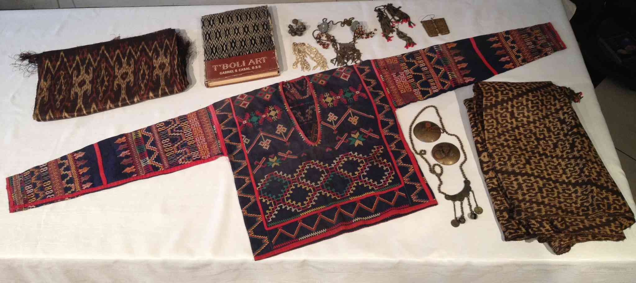 A lot of T'boli ornaments and weavings, and a book on T'boli art