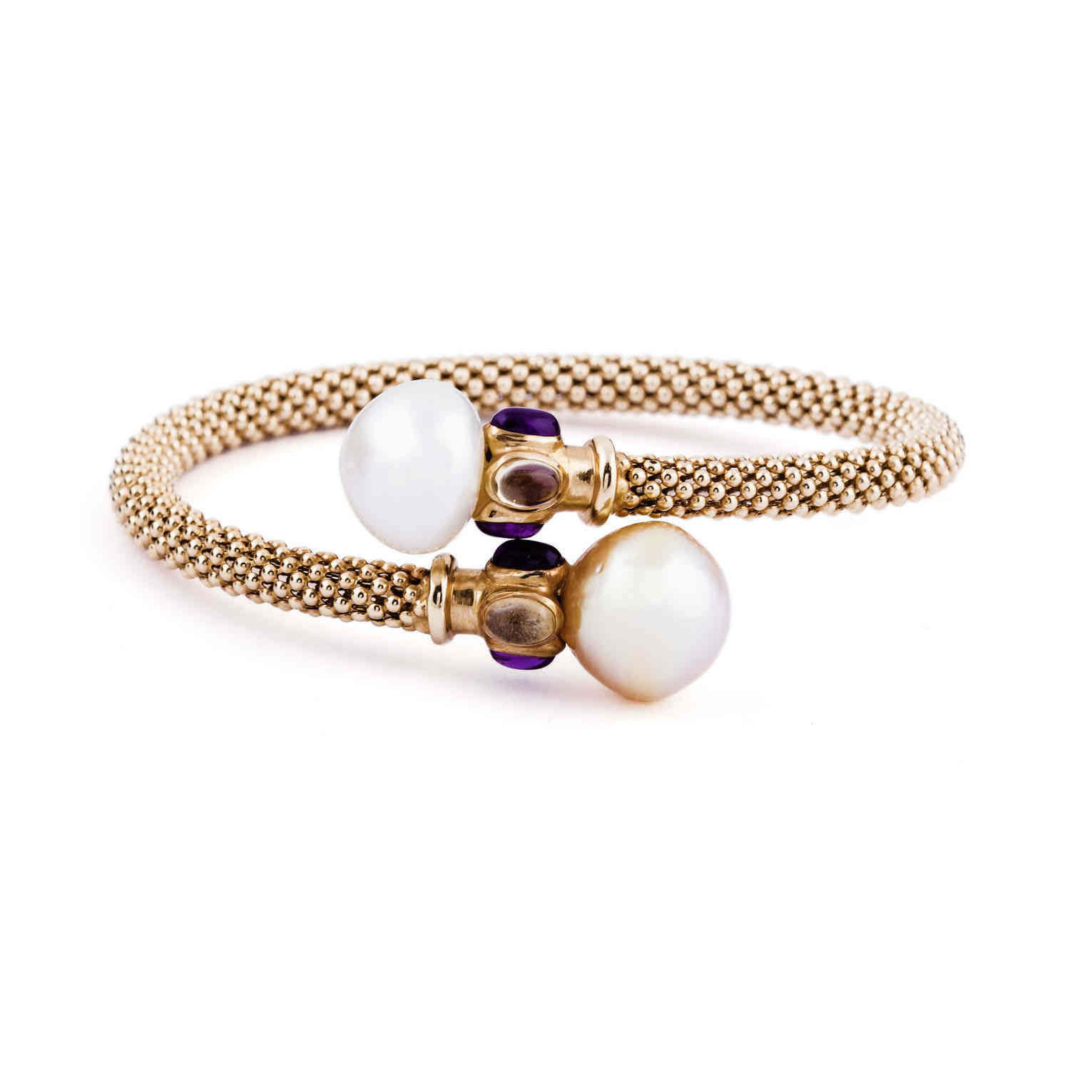 A pearl and gold bracelet - A gold bead bangle with champagne and white ...