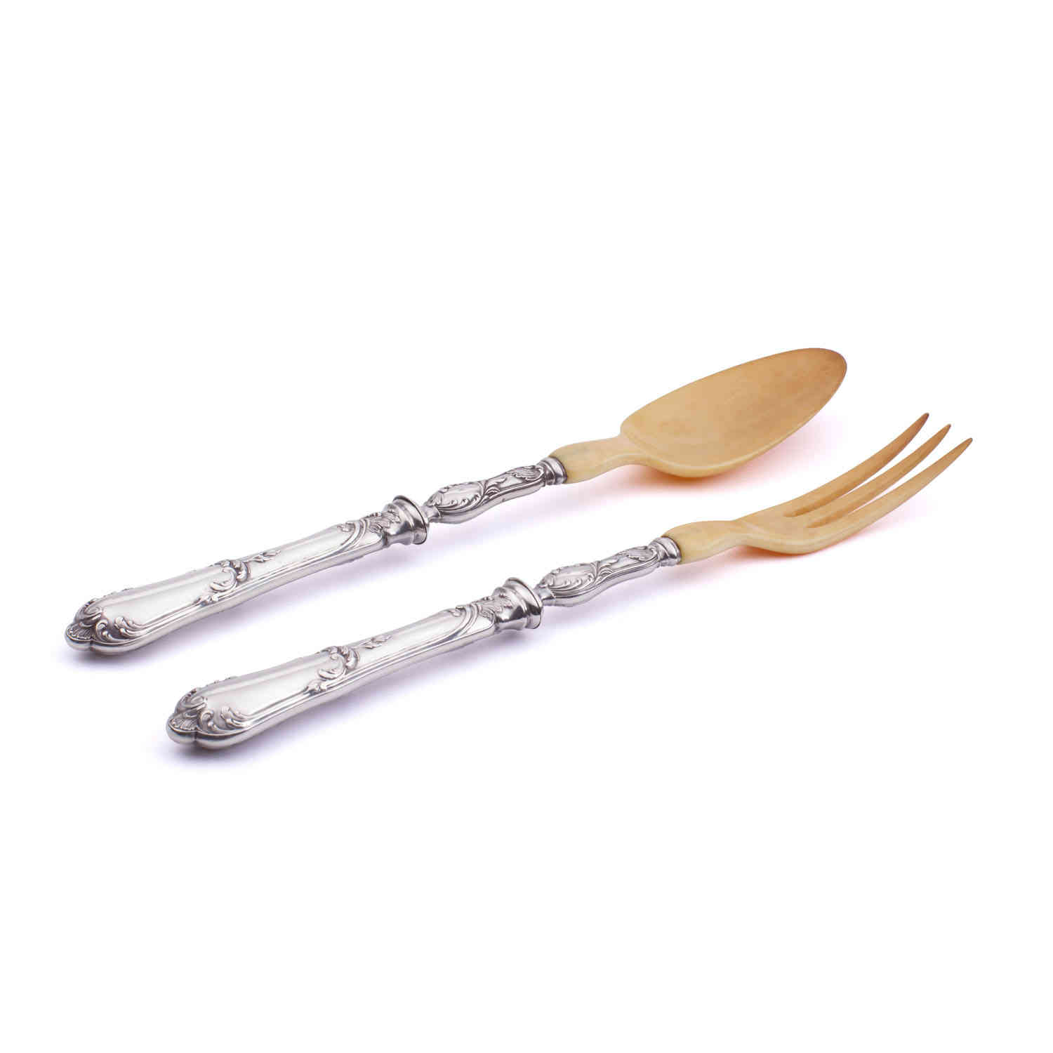 A sterling silver and ivory salad serving set