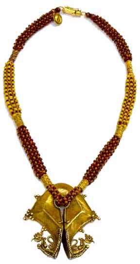 Excavated red, yellow and orange faience beads with gold beads from the ...