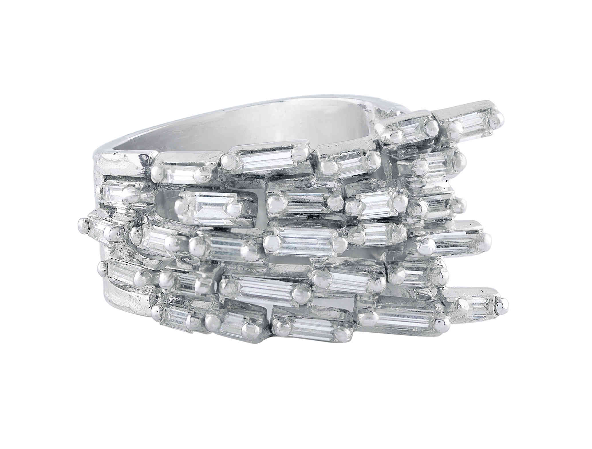 A multi-layered diamond ring, set in white gold