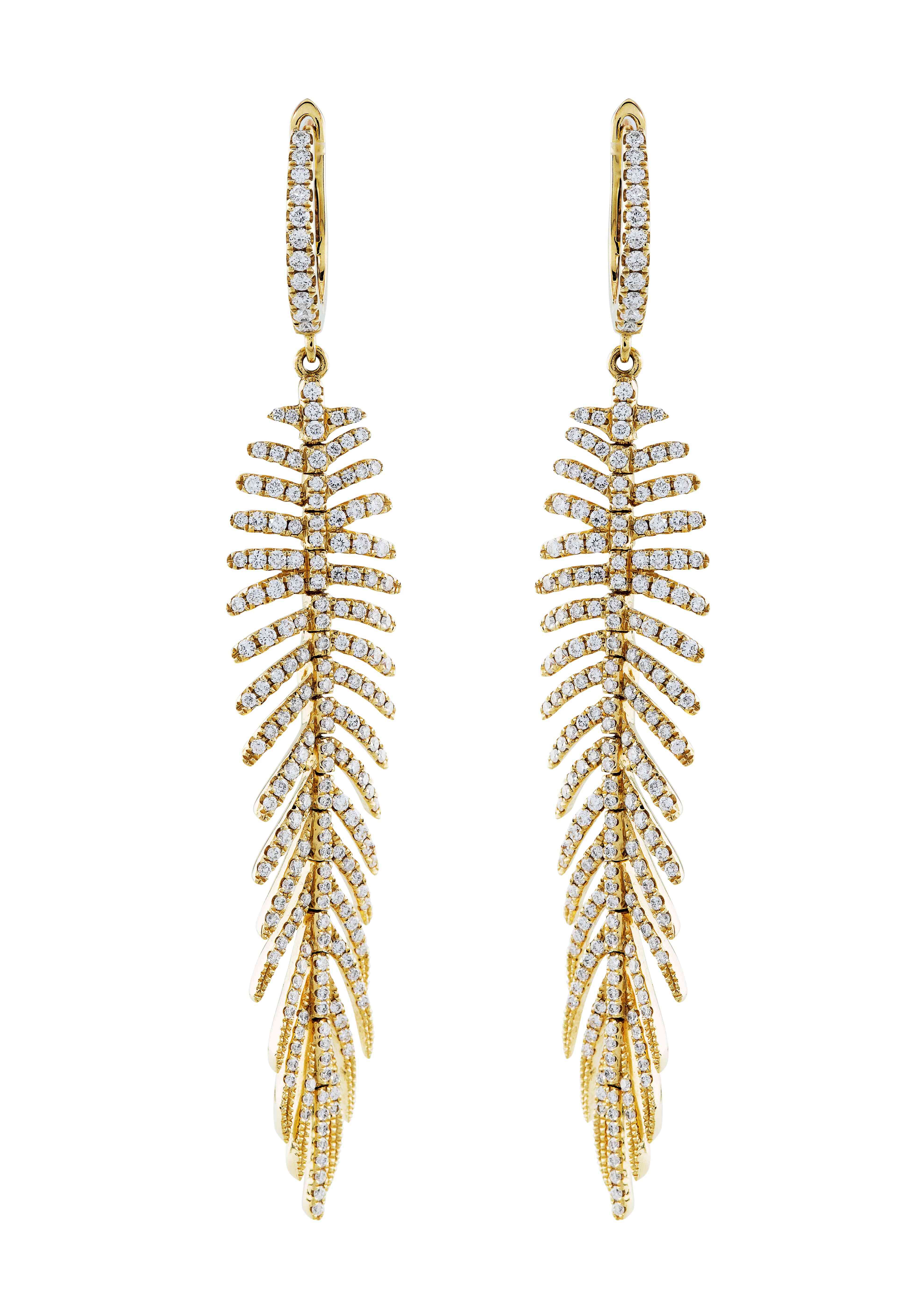 - A pair of 18k yellow gold feather design diamond earrings