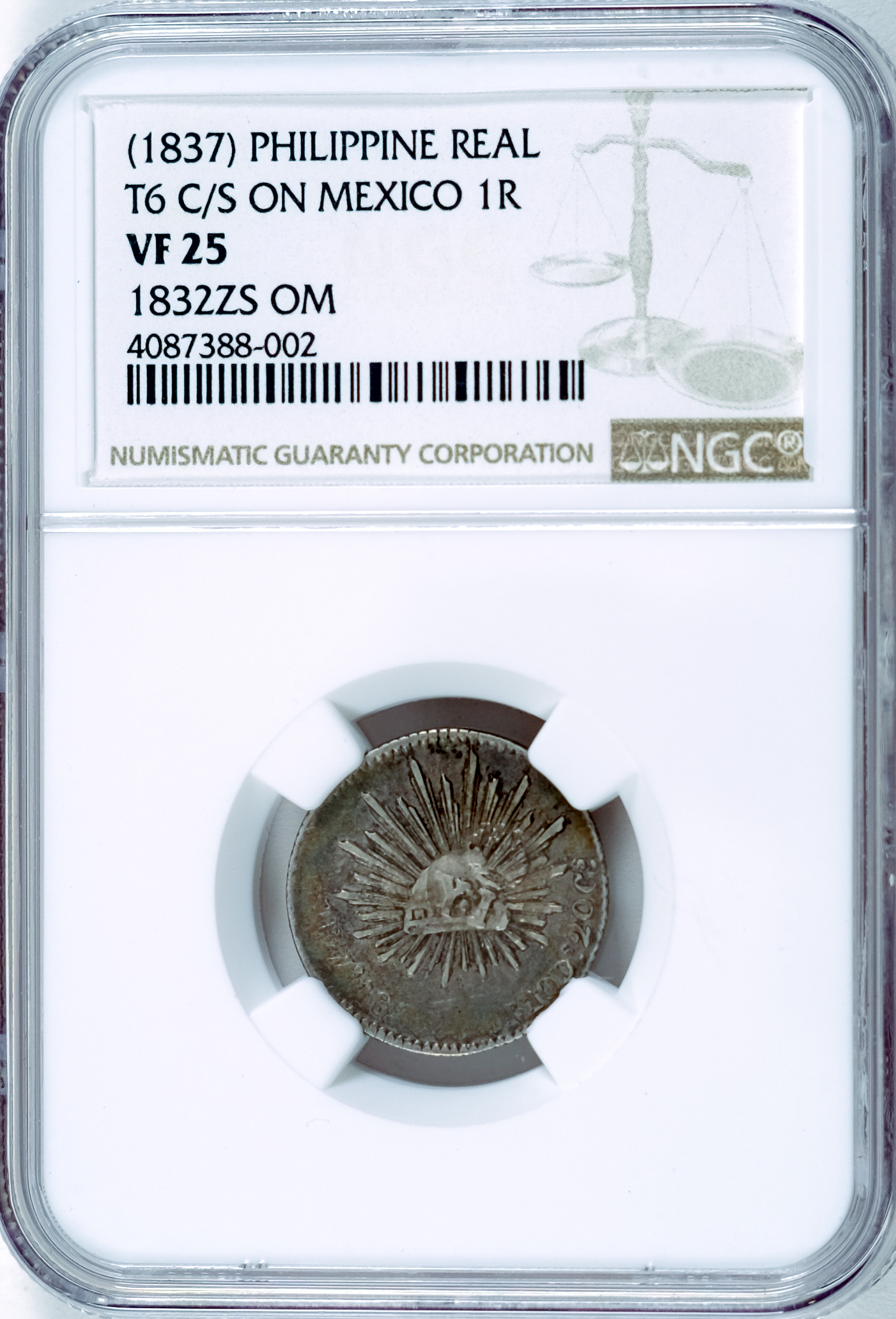 - A Philippine Y.II. countermark on 1832 Mexico 1 real