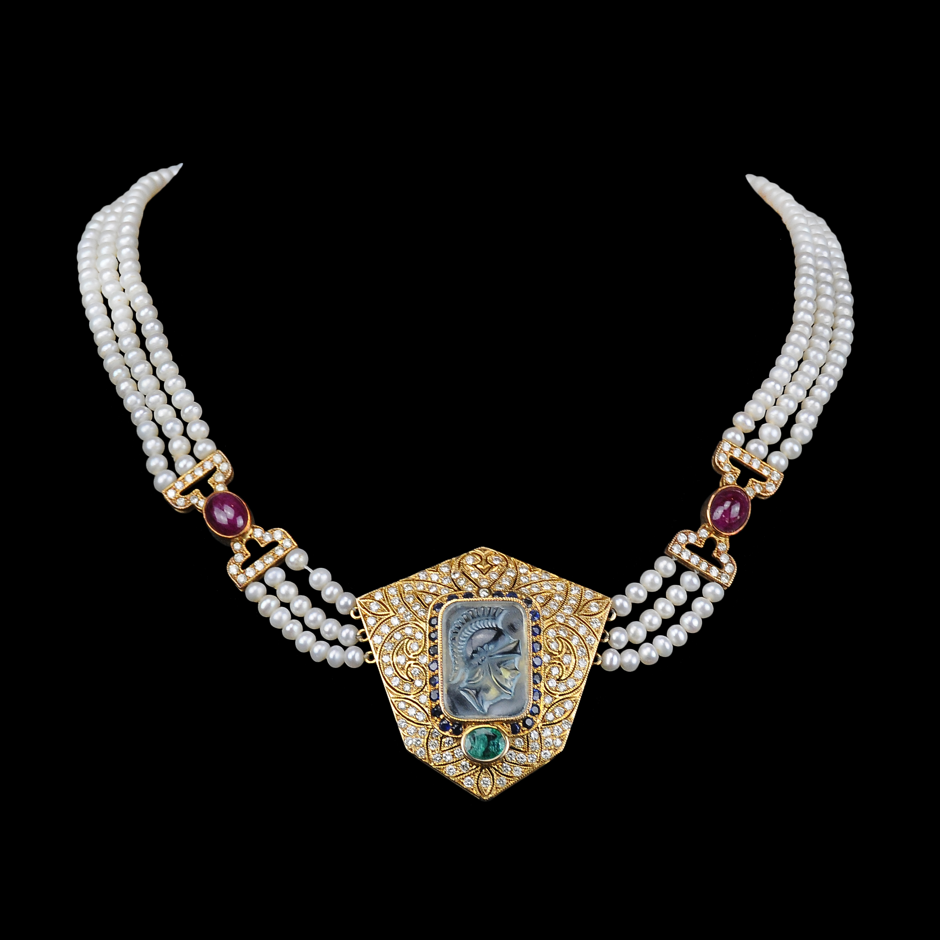 De Capricho - A three-strand seed pearl, cabochon ruby, diamond ...