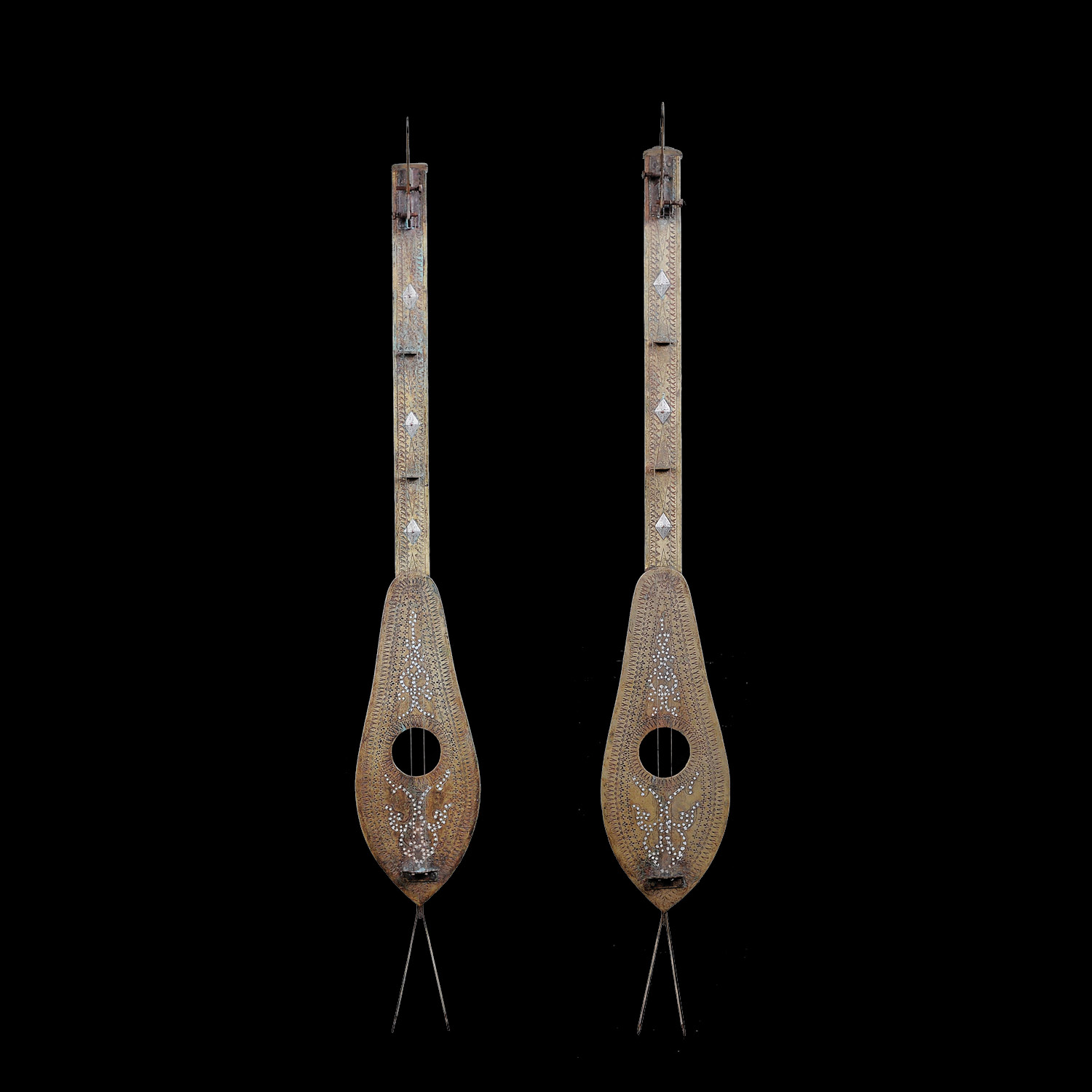- A pair of brass lutes or Kudyapi