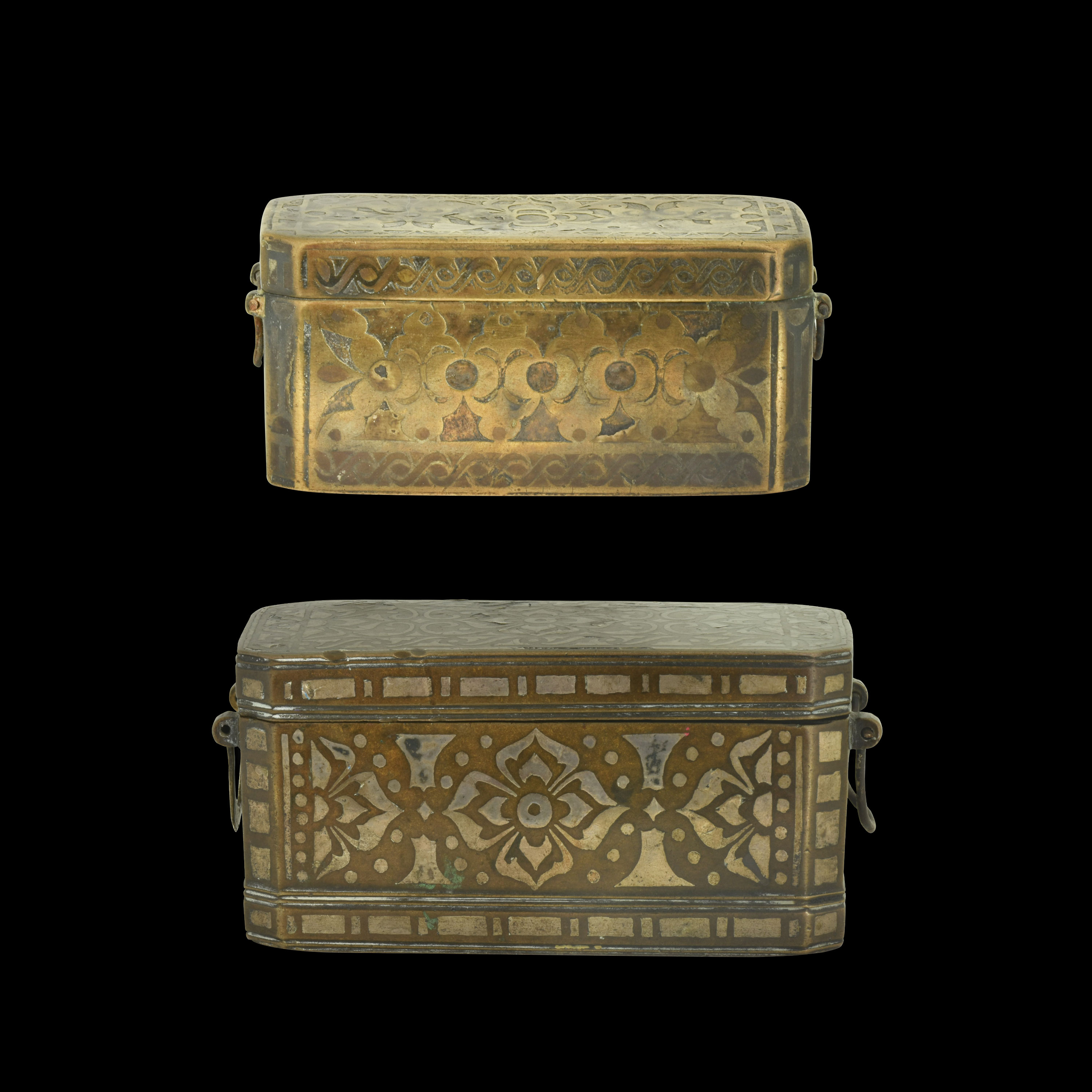 - A collection of two silver inlaid betel nut boxes