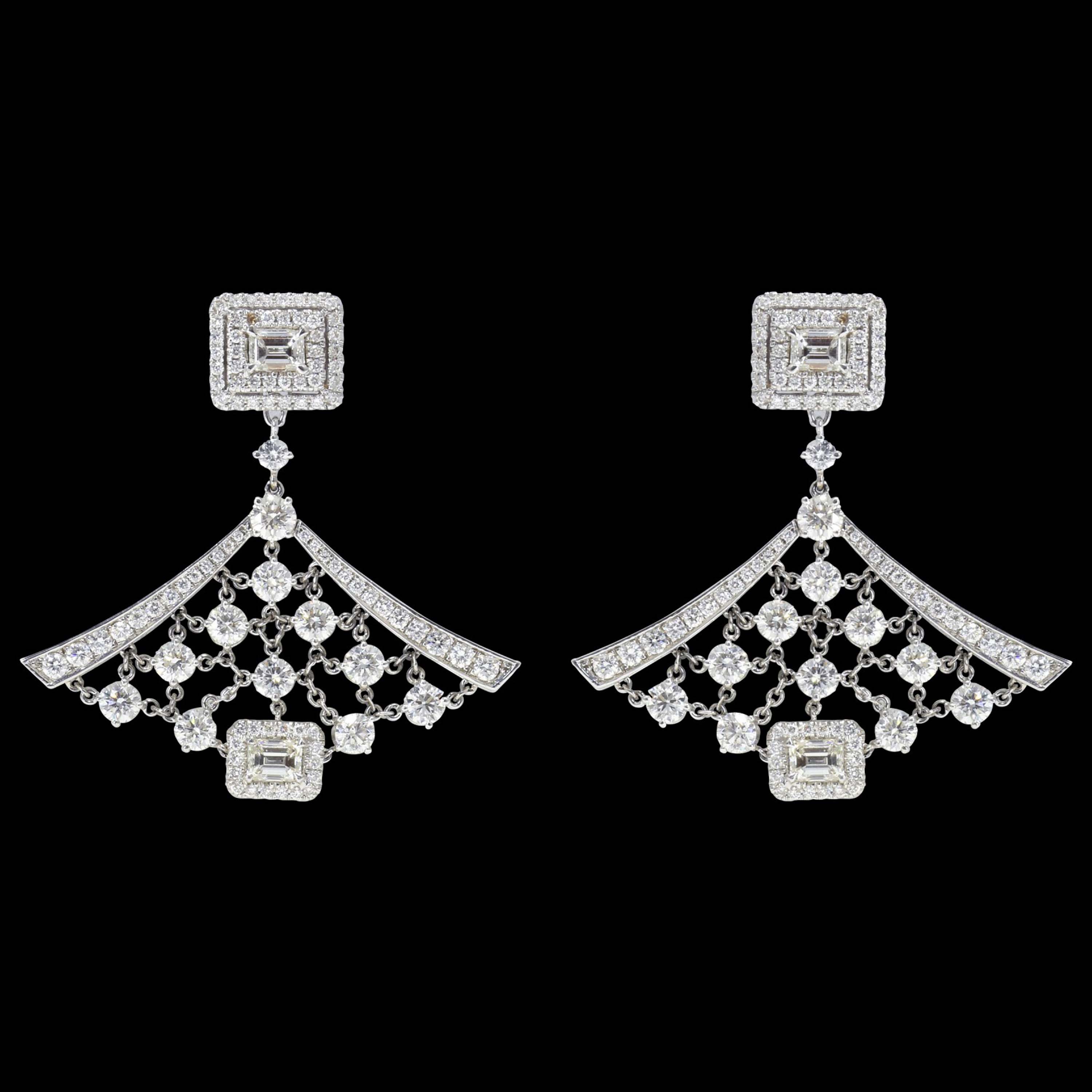 - An 8.3 tcw pair of diamond dangling earrings set in 18k white gold ...
