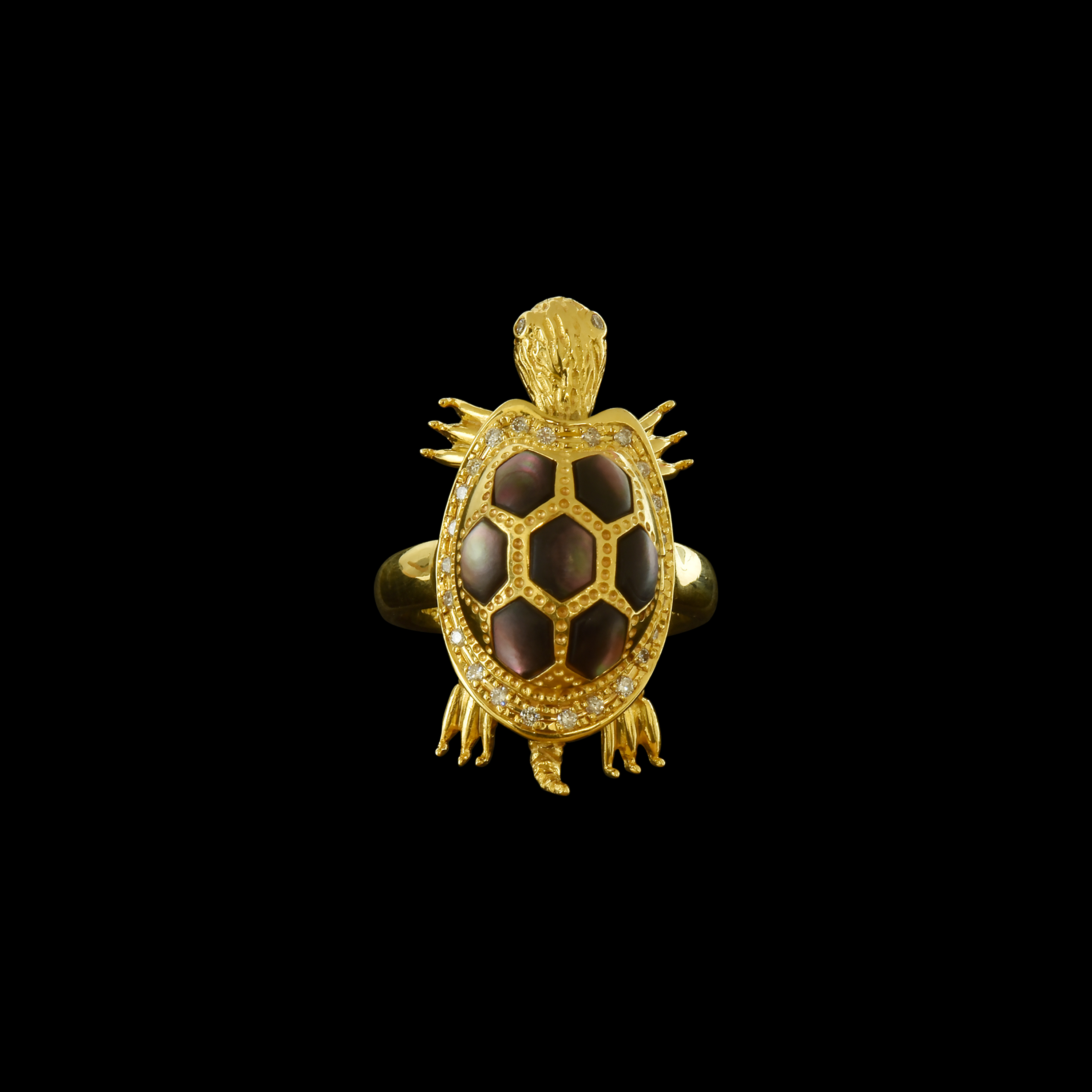 - A turtle locket ring set in 18k yellow gold ring