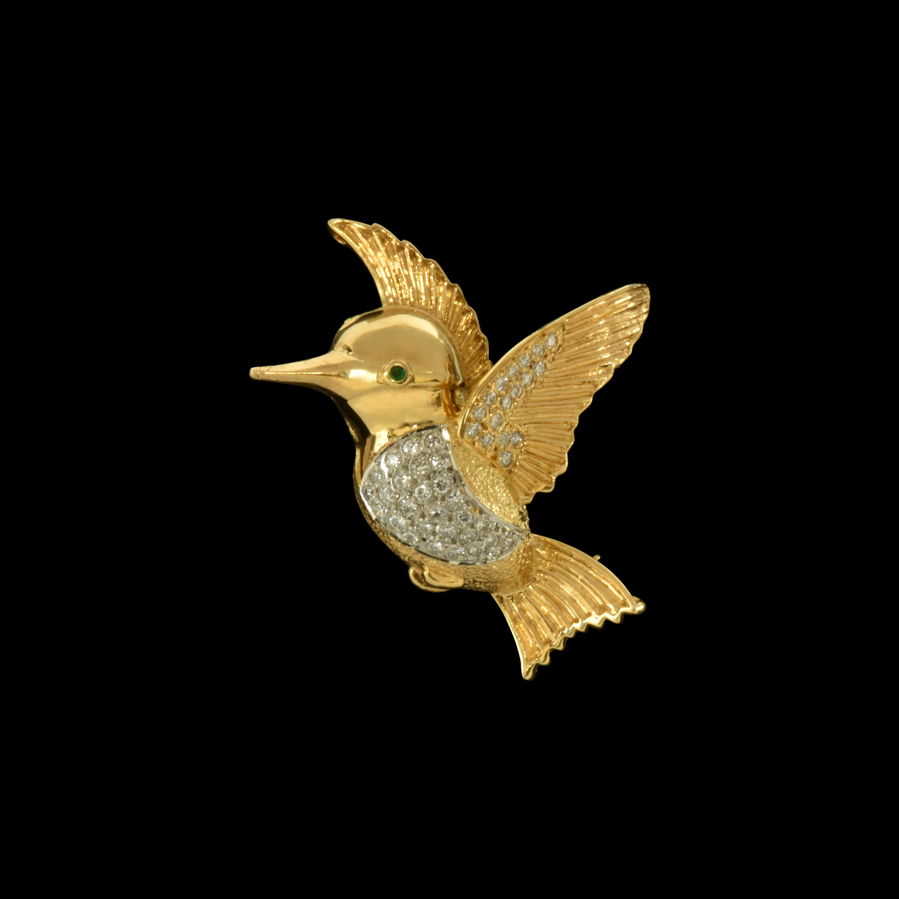 - A 0.28 tcw diamond bird pin 18k yellow gold