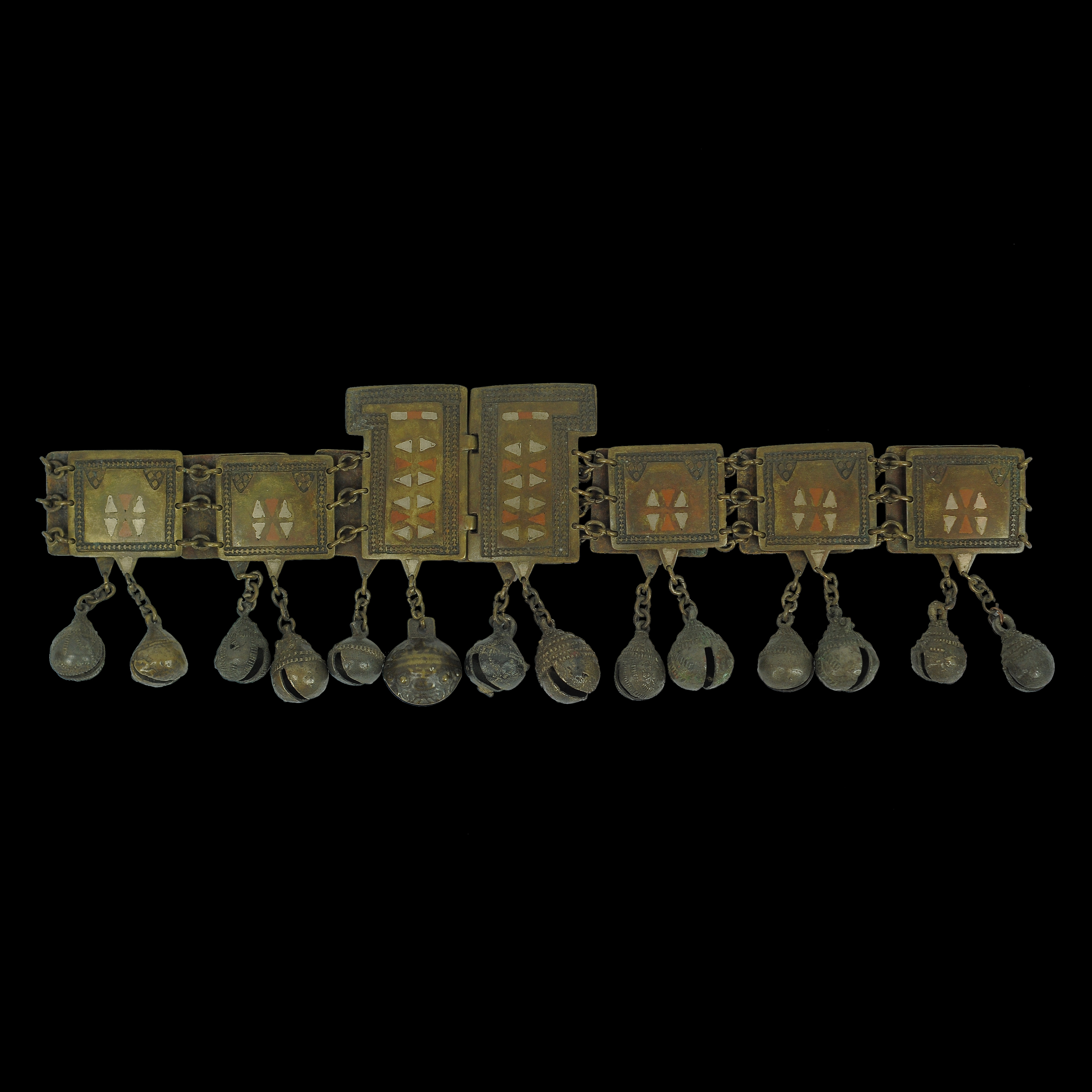 - A brass Bagobo belt with bells