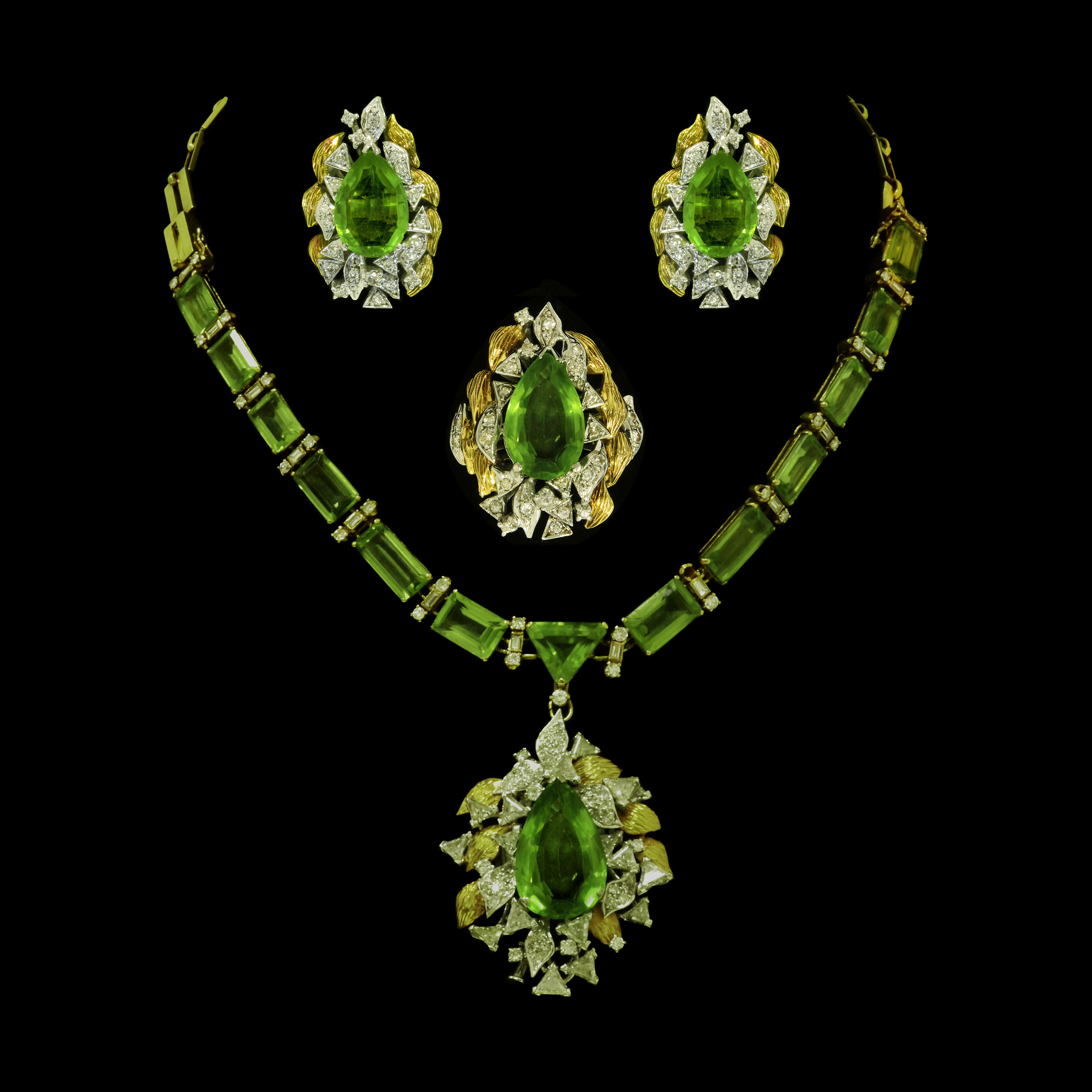 - A pear shaped peridot and diamonds parure set in 14k yellow gold