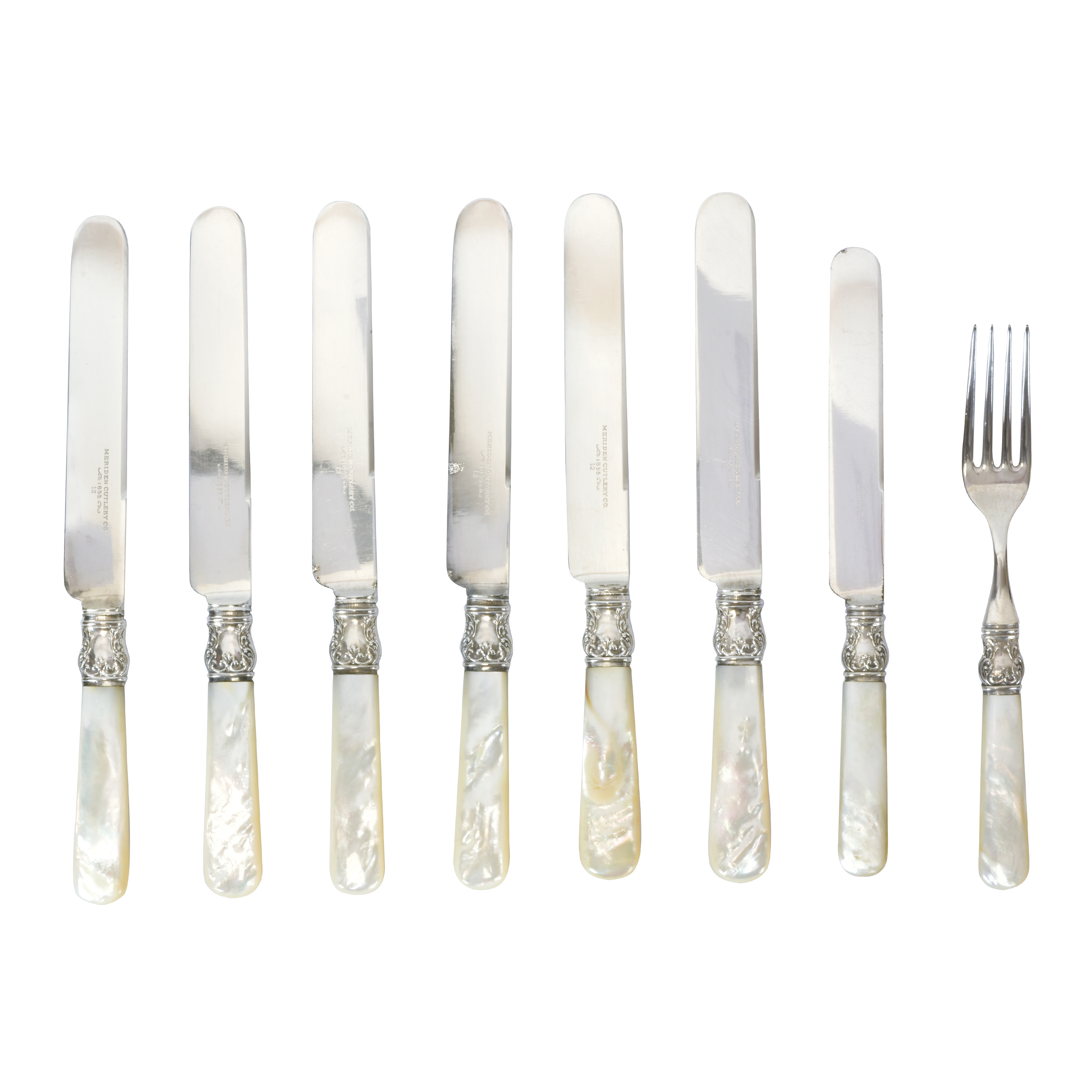 Meriden Cutlery Co. - A set of mother of pearl detailed cutlery