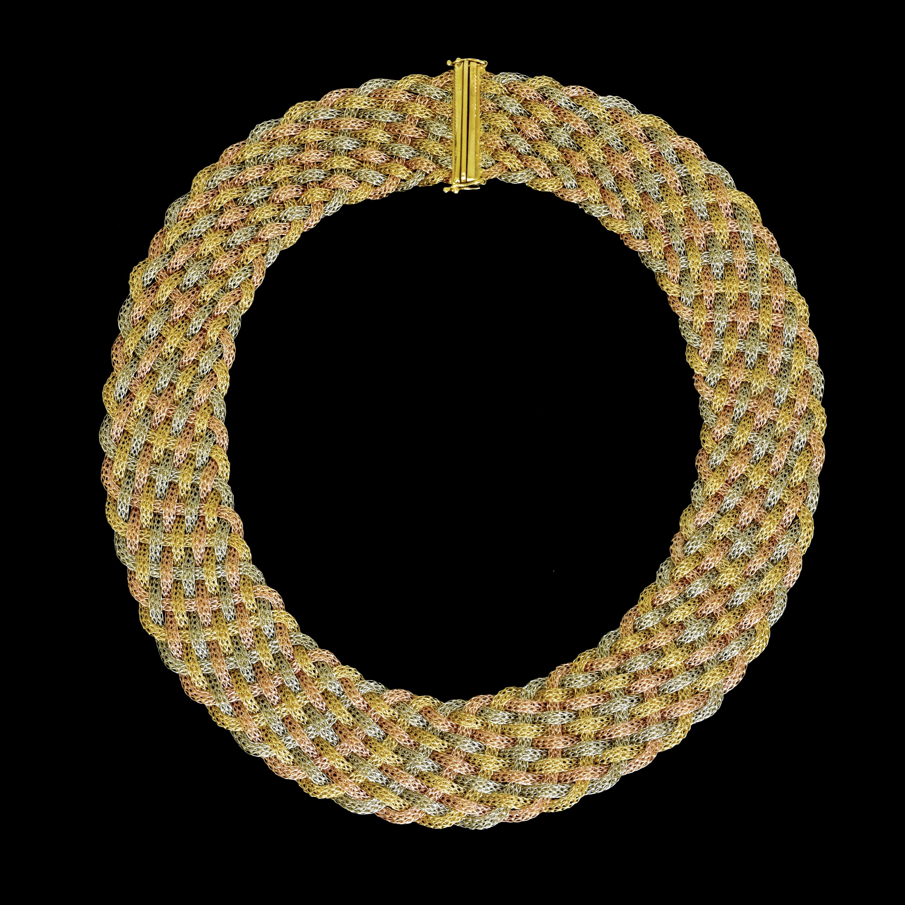 - An 18k tri-color gold necklace