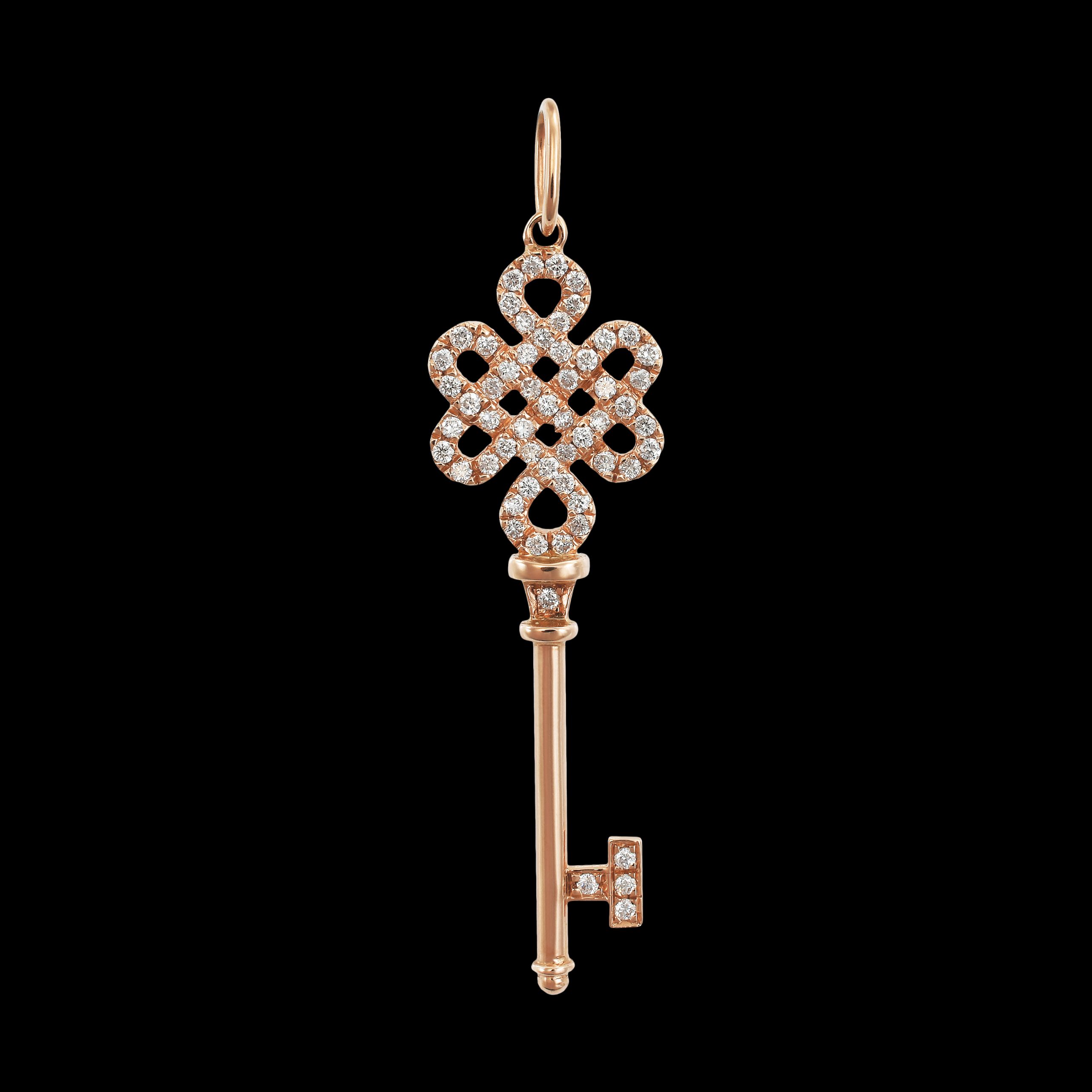 - A diamond key pendant set in white gold