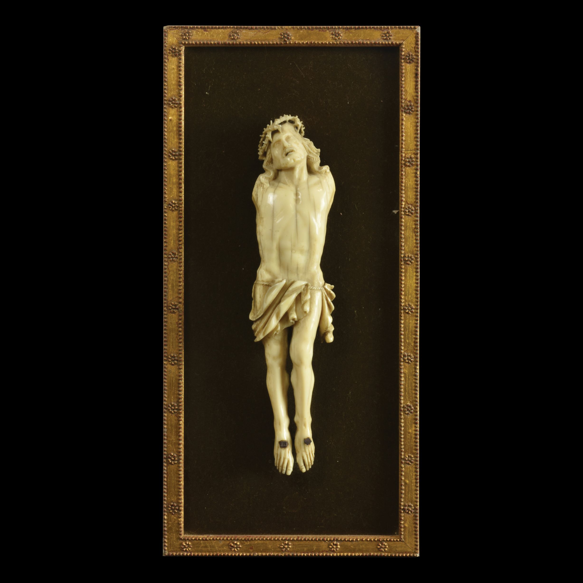 - A solid ivory Baroque style Santo Cristo