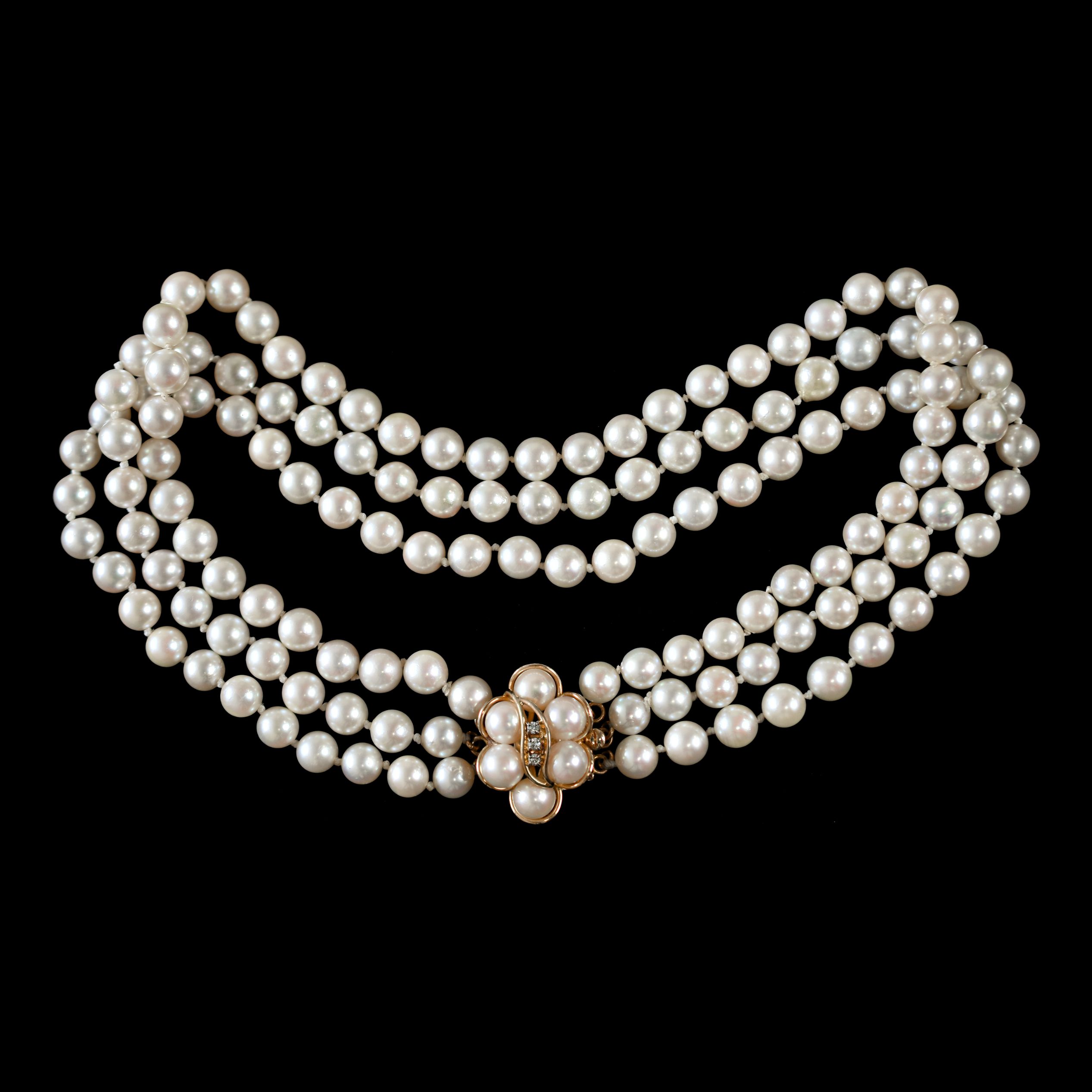 - A cultured pearl collar necklace with gold pearl and diamond clasp