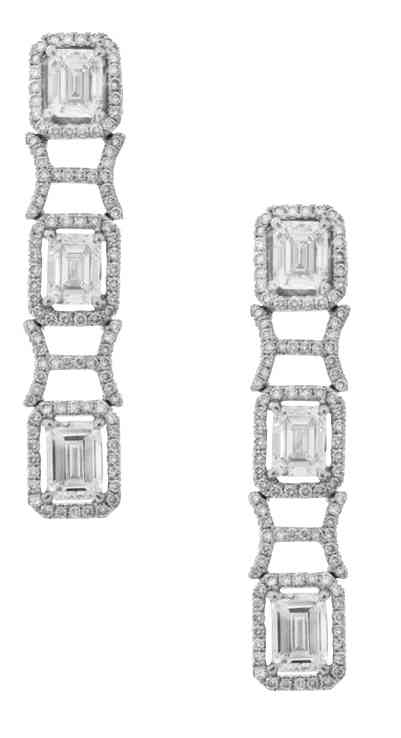 A fine pair of emerald-cut diamond line earrings