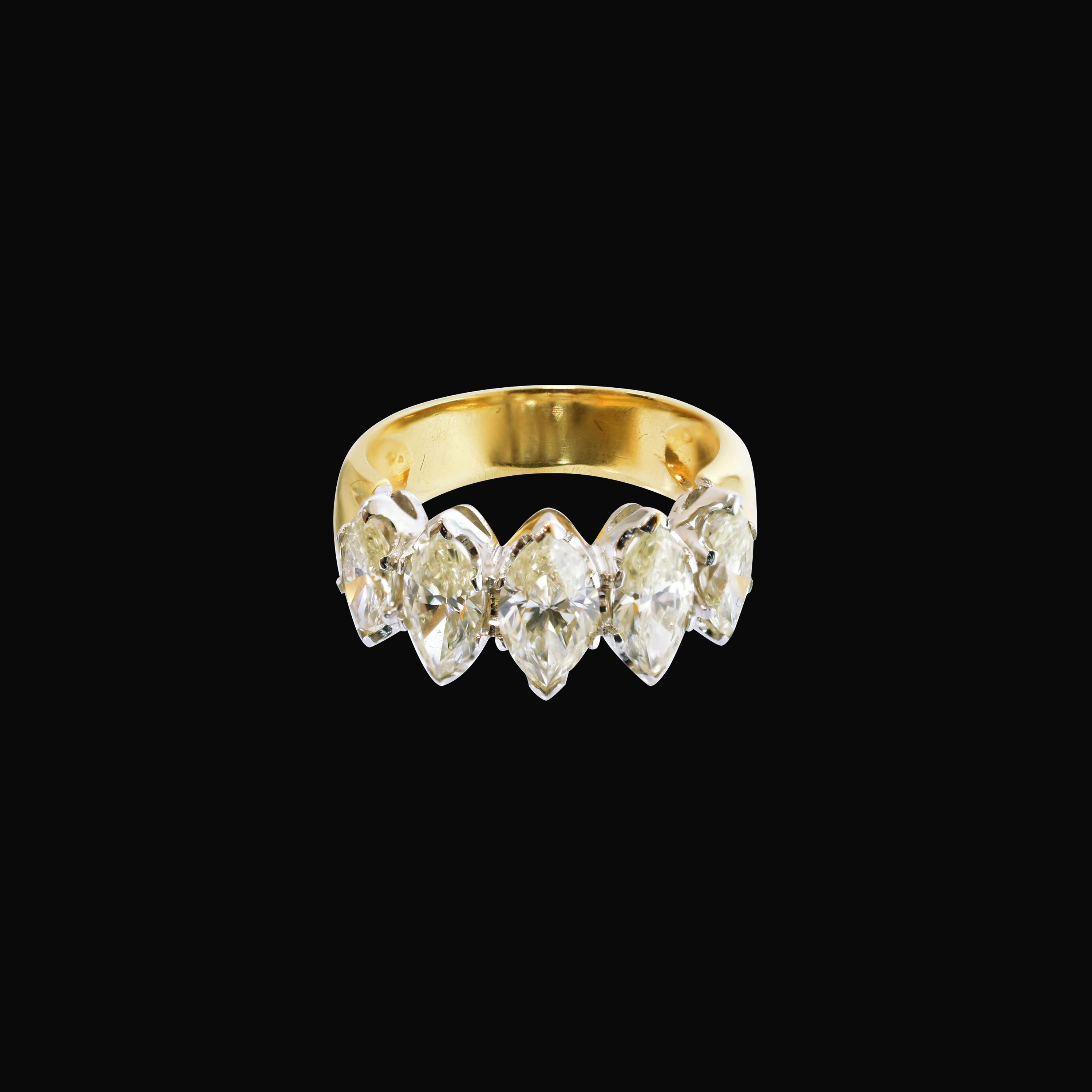 - An approximately 5.00 tcw marquise diamond ring set in 14k yellow ...