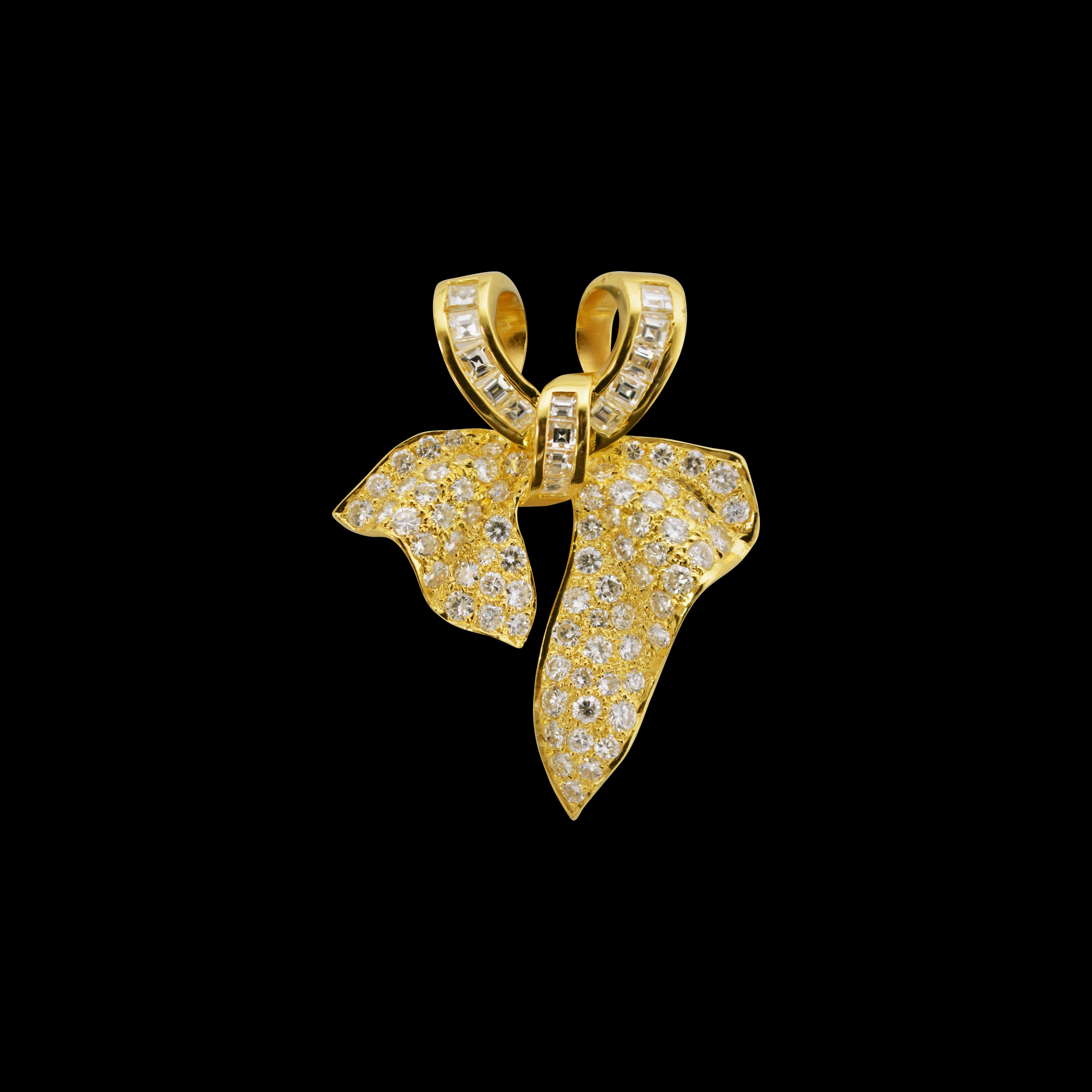- A ribbon pendant with approximately 4.00 tcw diamons set in 18k ...