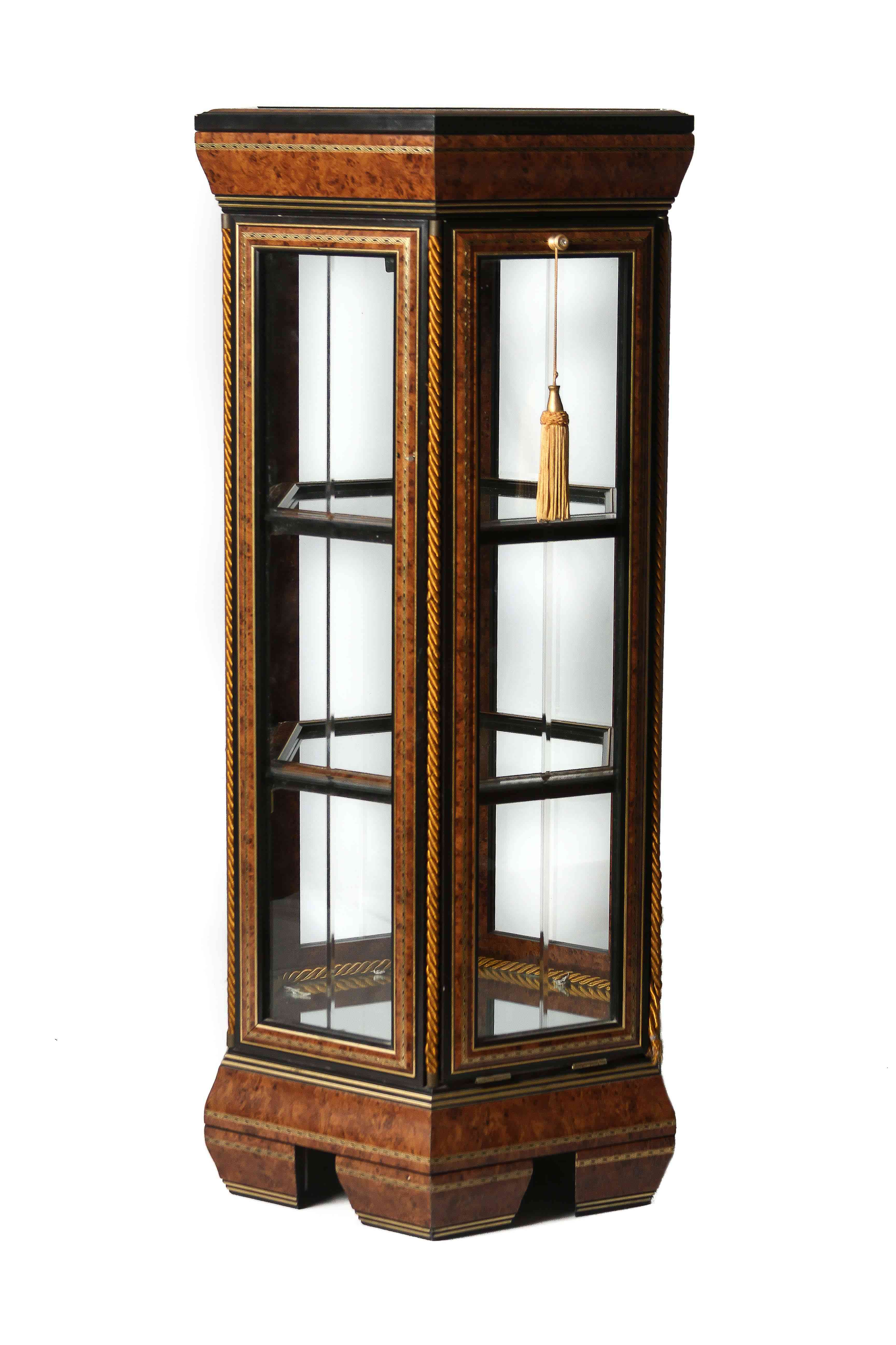 A fine gilt wood and glass vitrine (display cabinet)