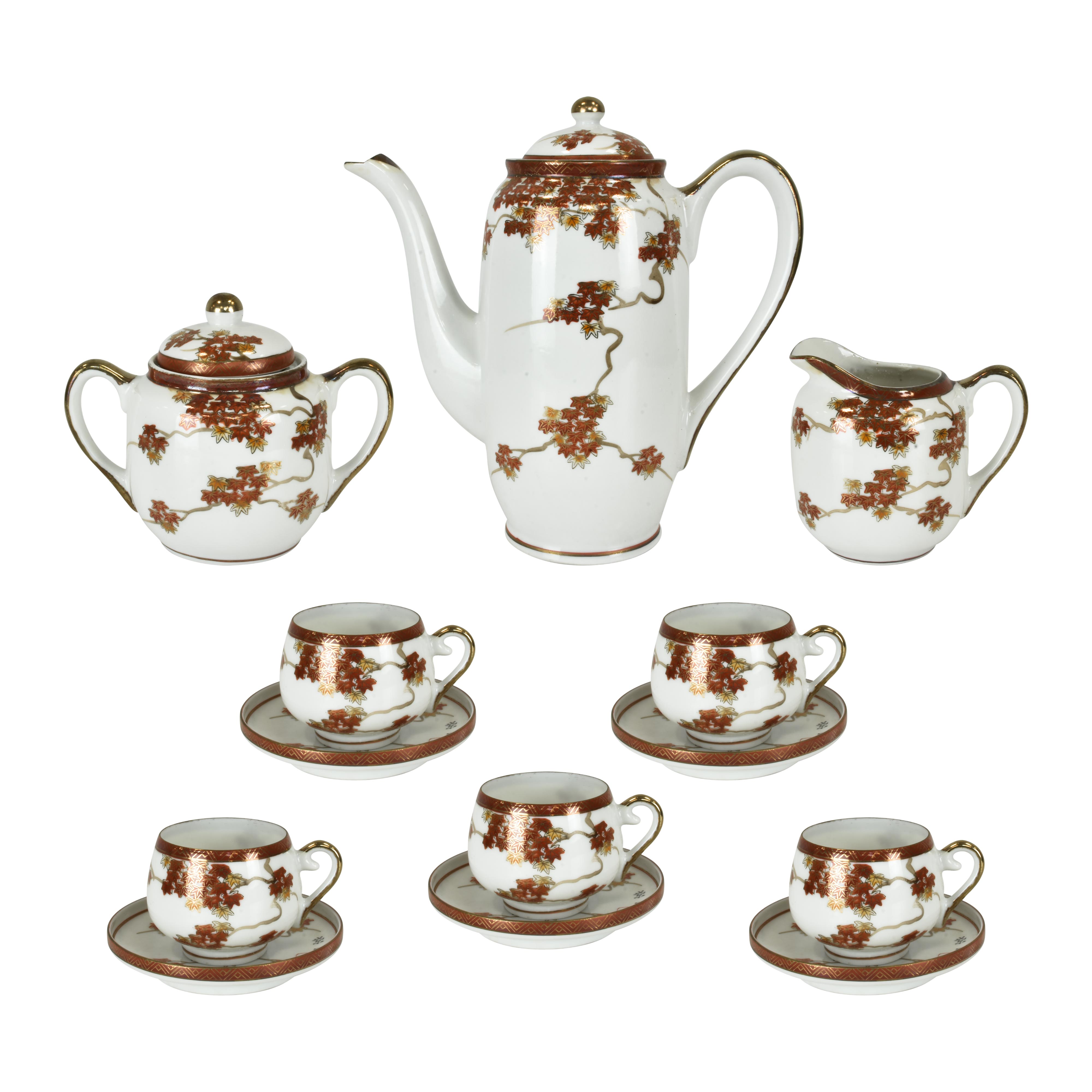 - A 15 piece Kutani China hand painted tea set service for 6
