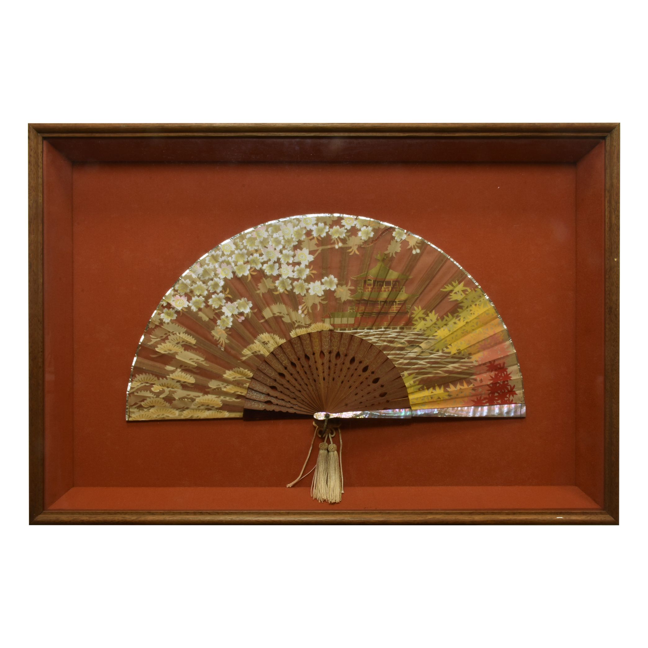 - A red Asian fan with Mother of Pearl guard