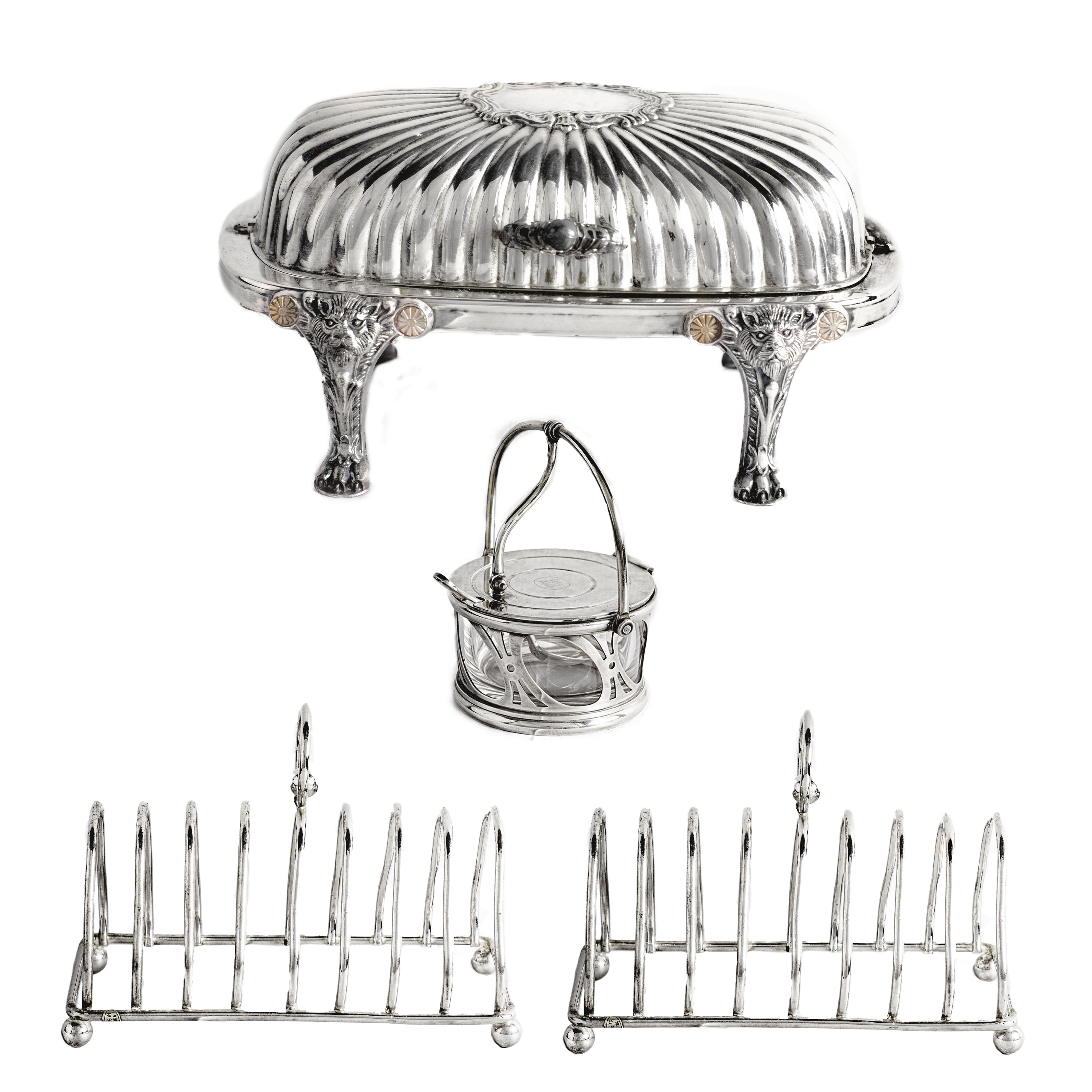 - A lot of toast racks, sugar and cream container with teaspoon, and a ...