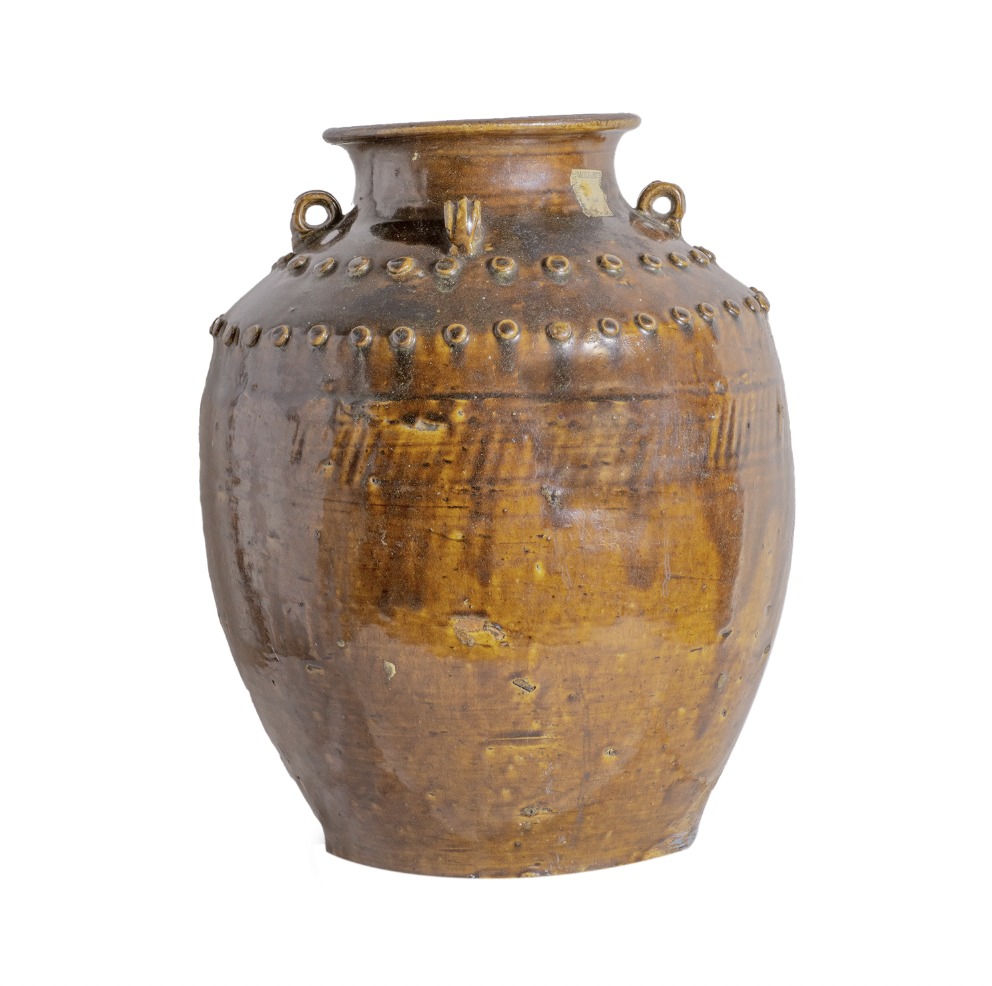 - A beaded brown jar with 4 lugs