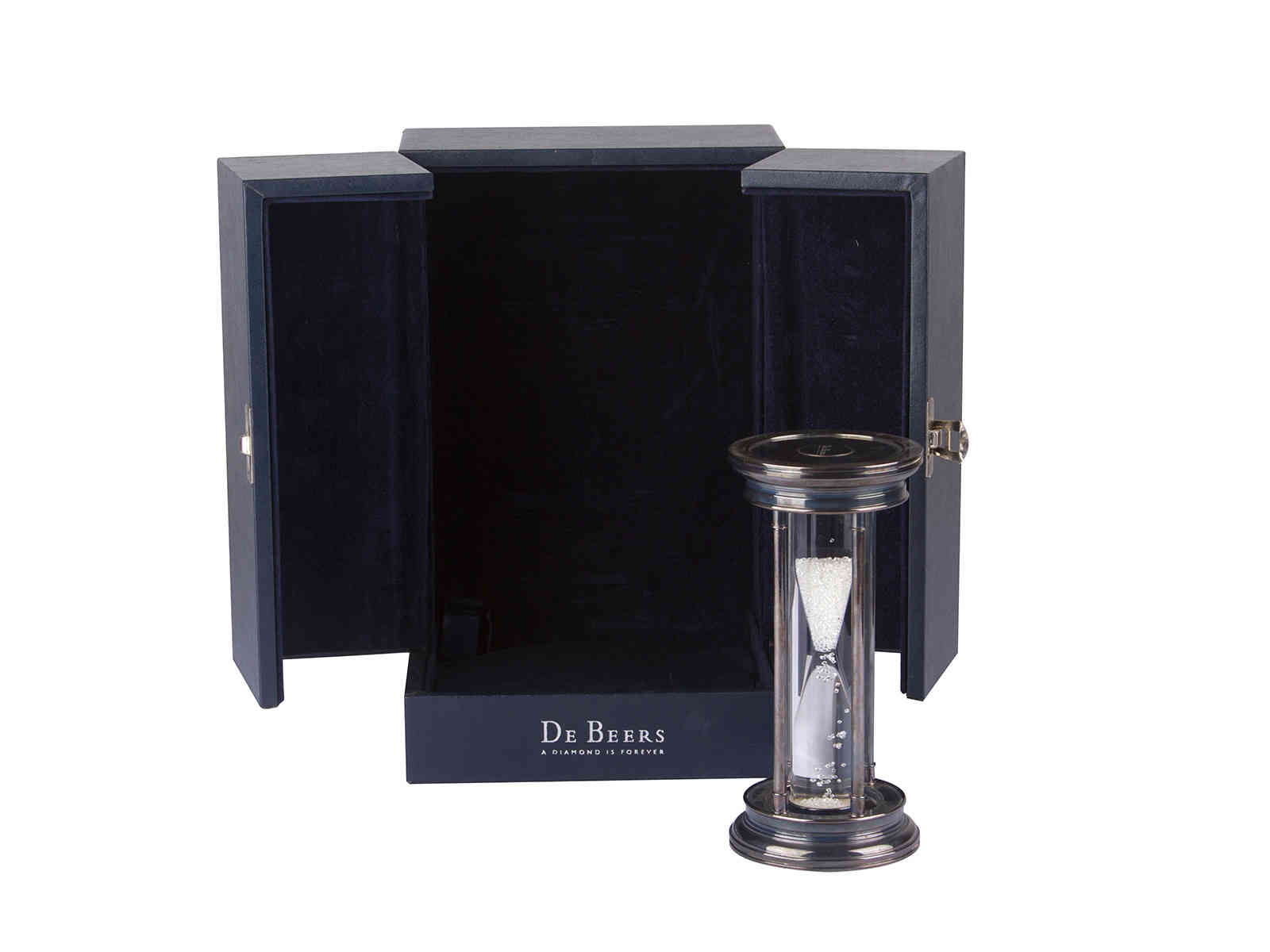 De Beers - A limited edition hourglass containing natural rough ...