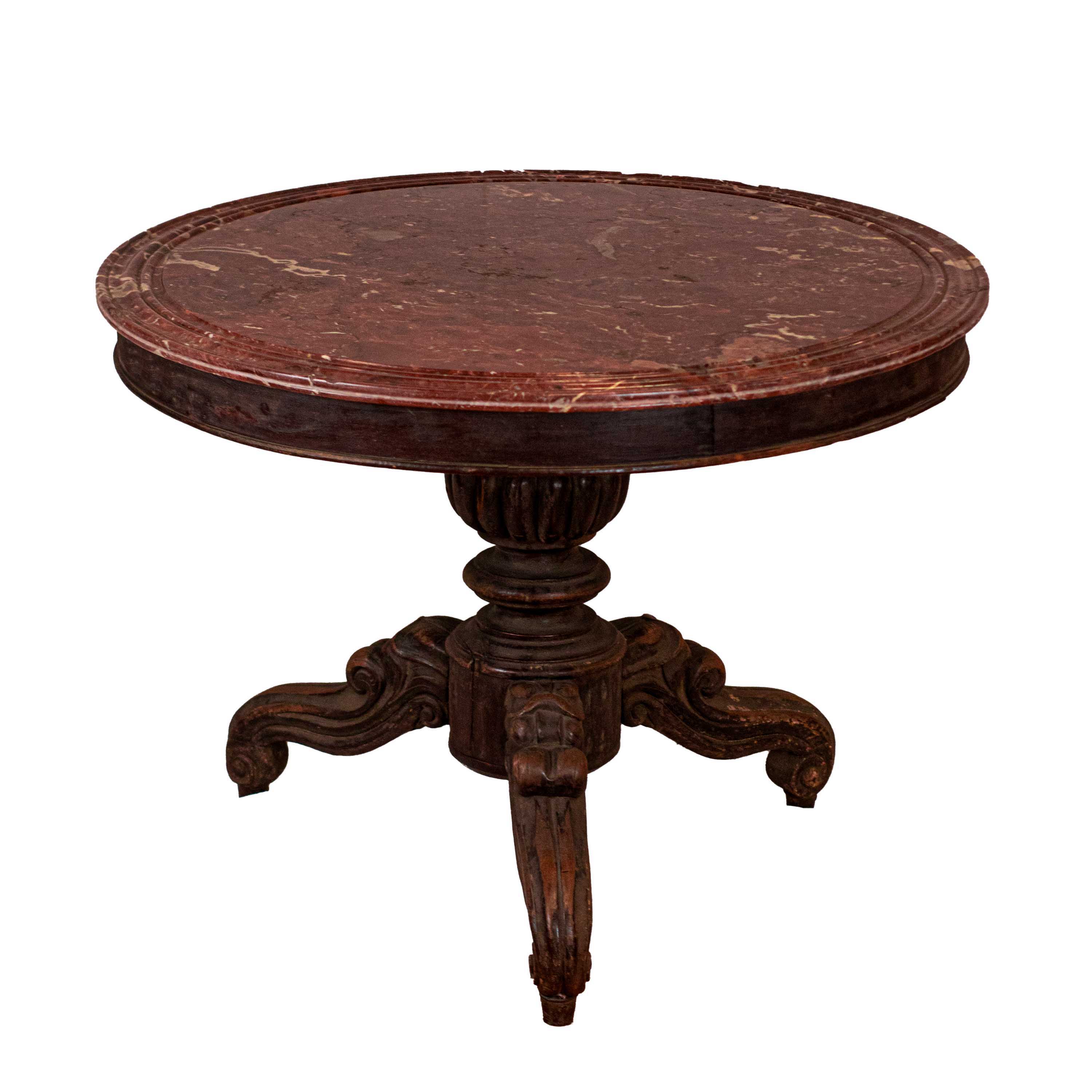 - A Victorian red marble top table