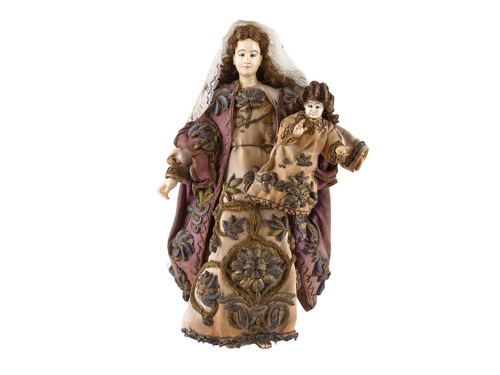 A Nuestra Señora del Rosario figurine with ivory hands, head, with hair ...
