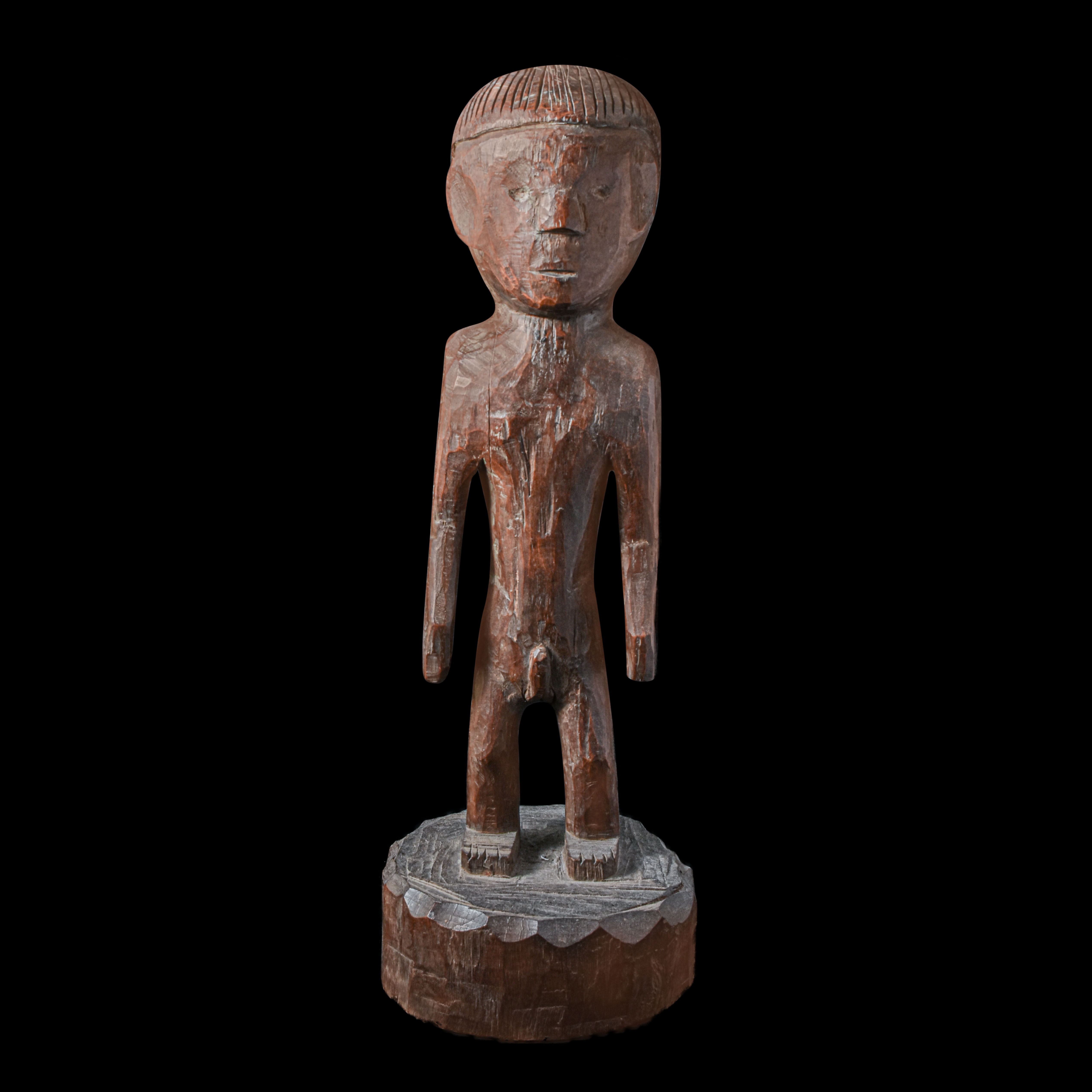 - A fine Kiangan standing male figure with rice wine (tapuy) patina
