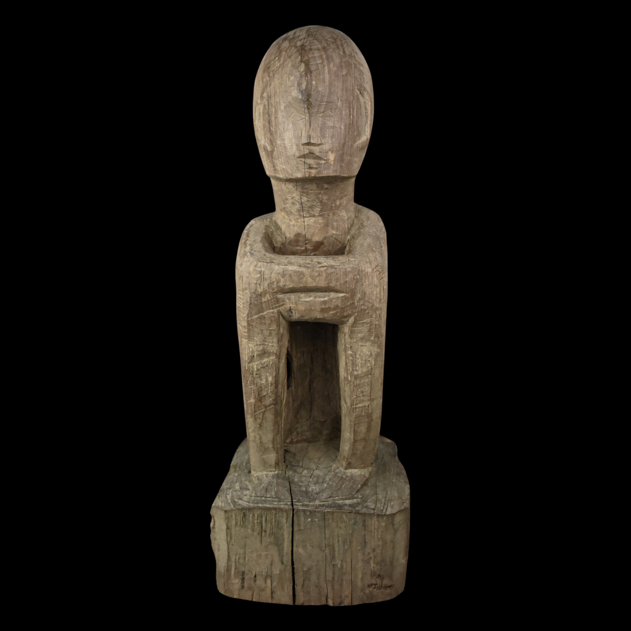 - A heart-shaped face seated female bulol