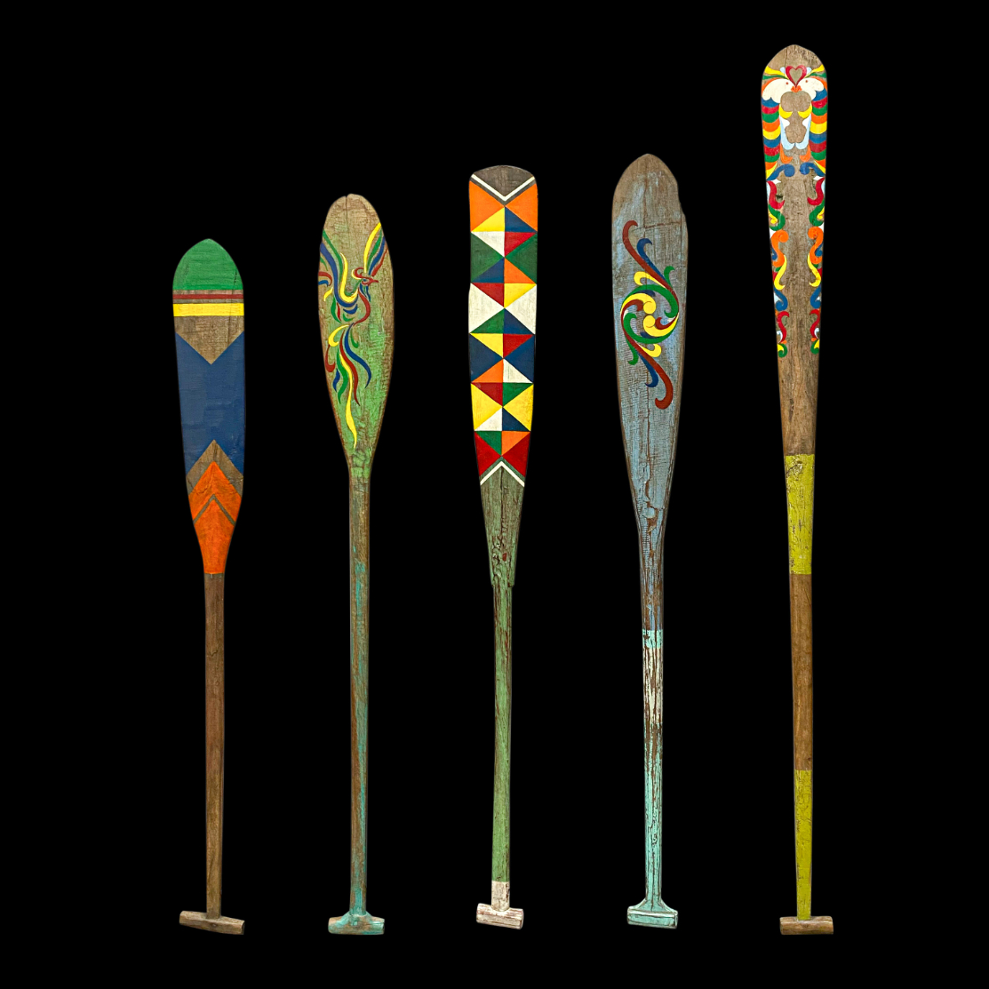 - A lot of 5 Samal Island hand-painted canoe paddles