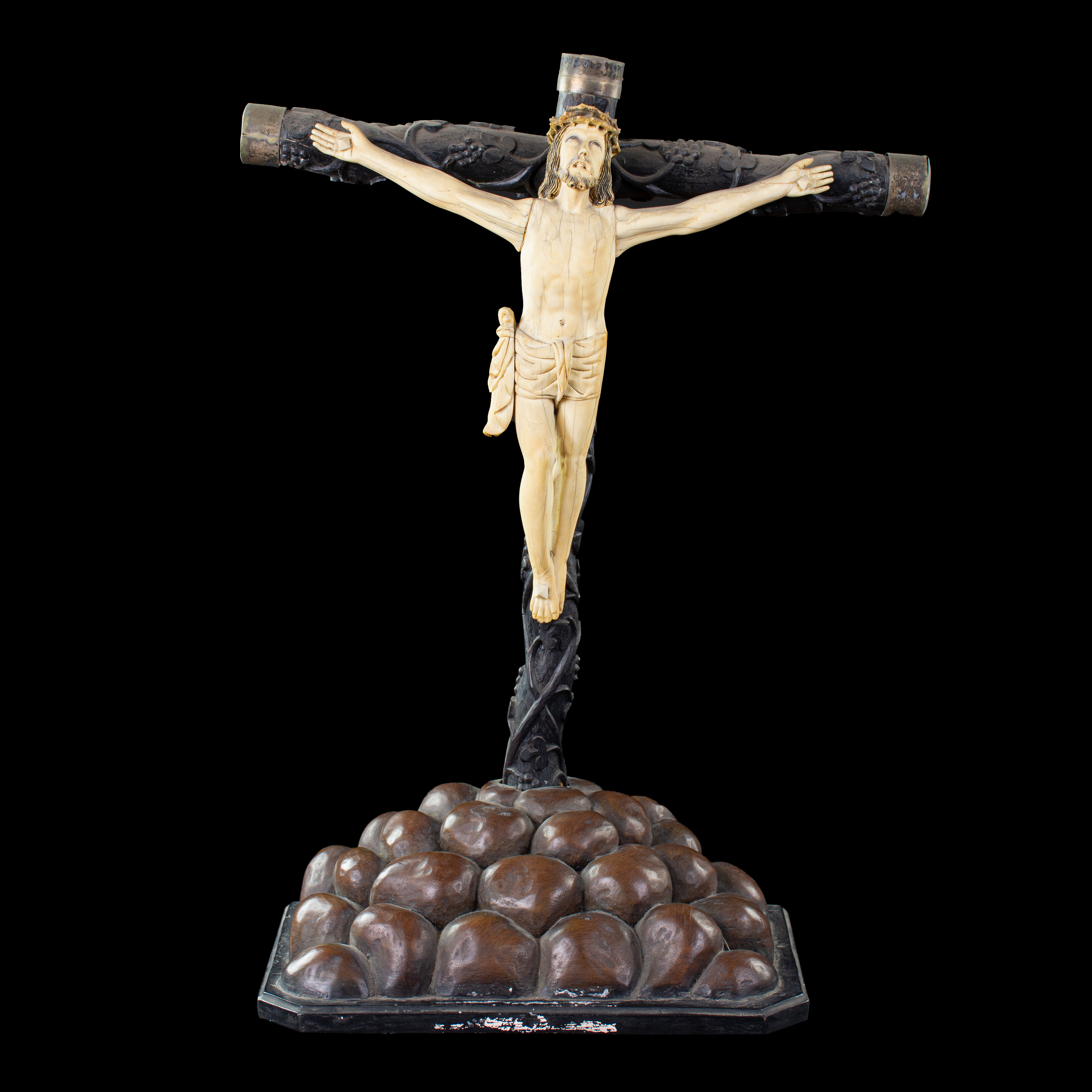 - A 17th century solid ivory Crucified Christ