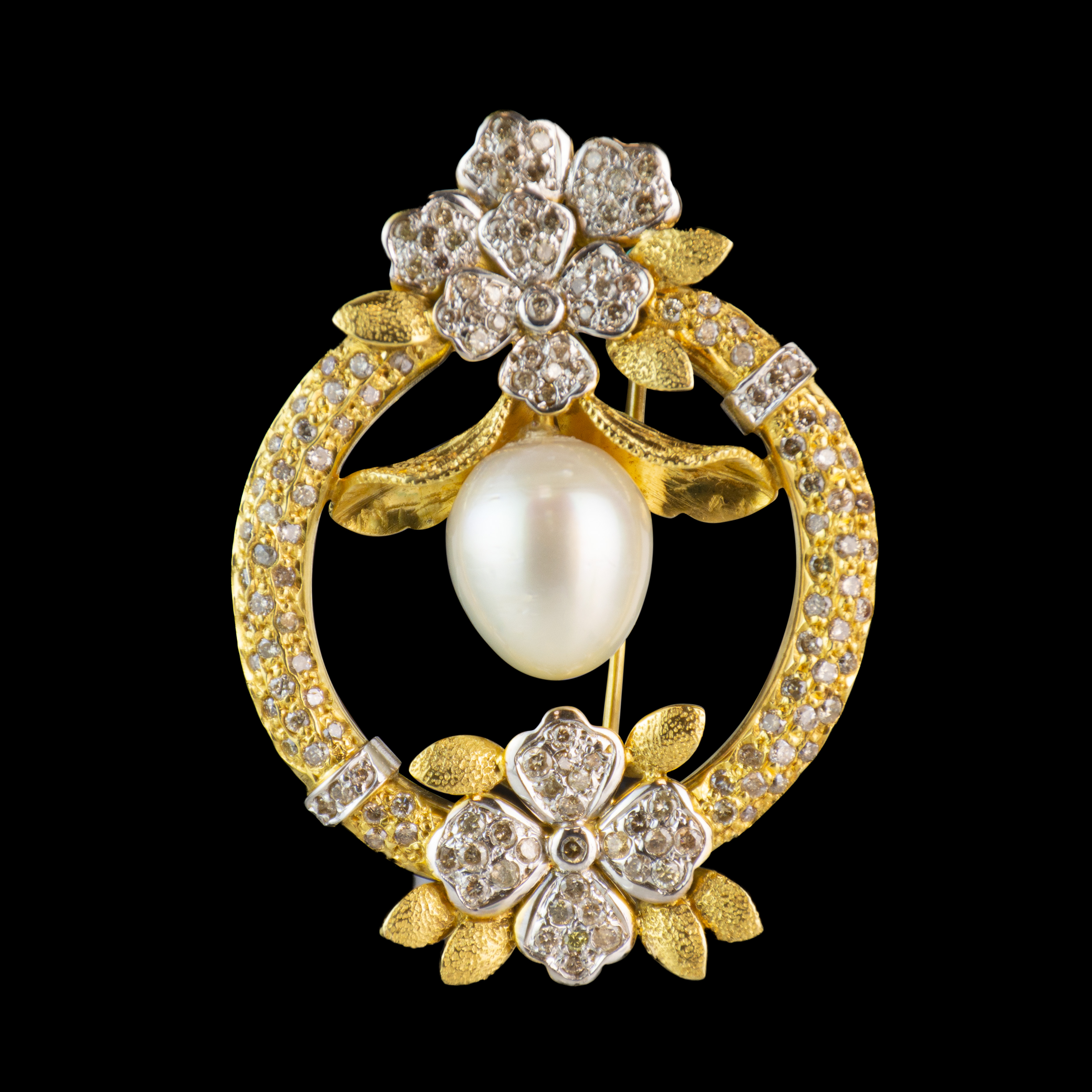 - A large and elegant south sea pearl brooch with diamond s set in 14k gold