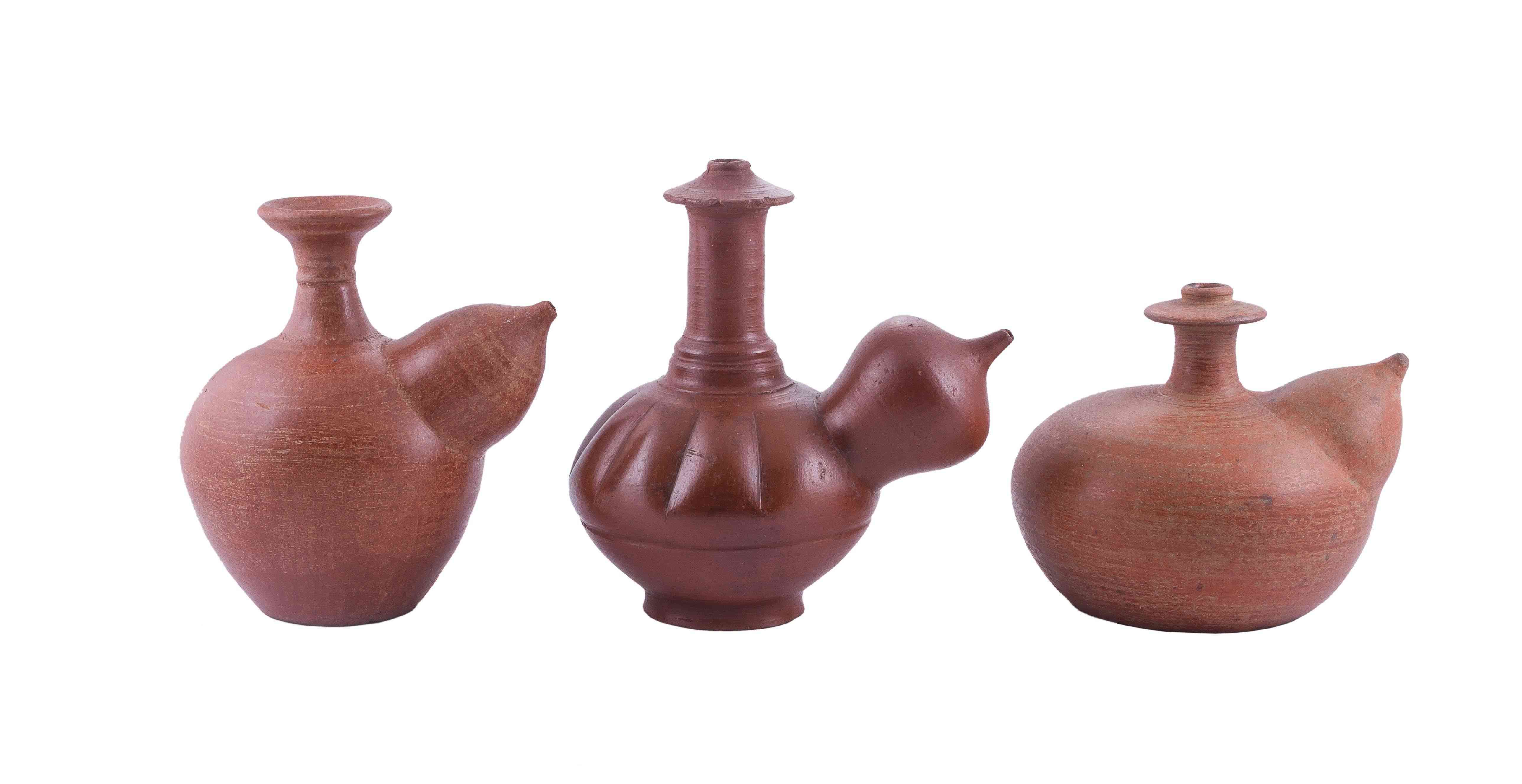 A lot of three Indonesian decorated pots