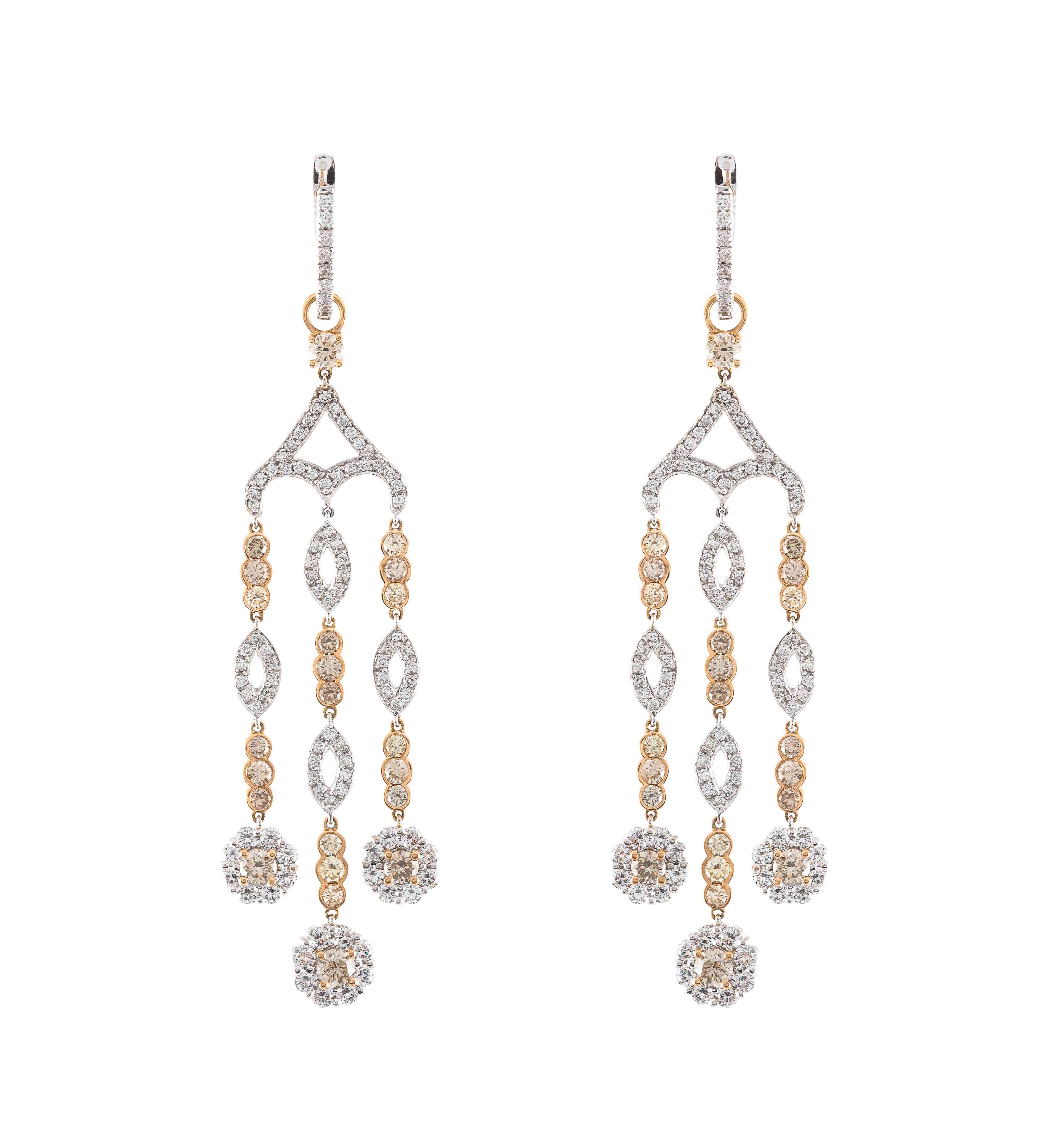 A pair of creole dangling earrings