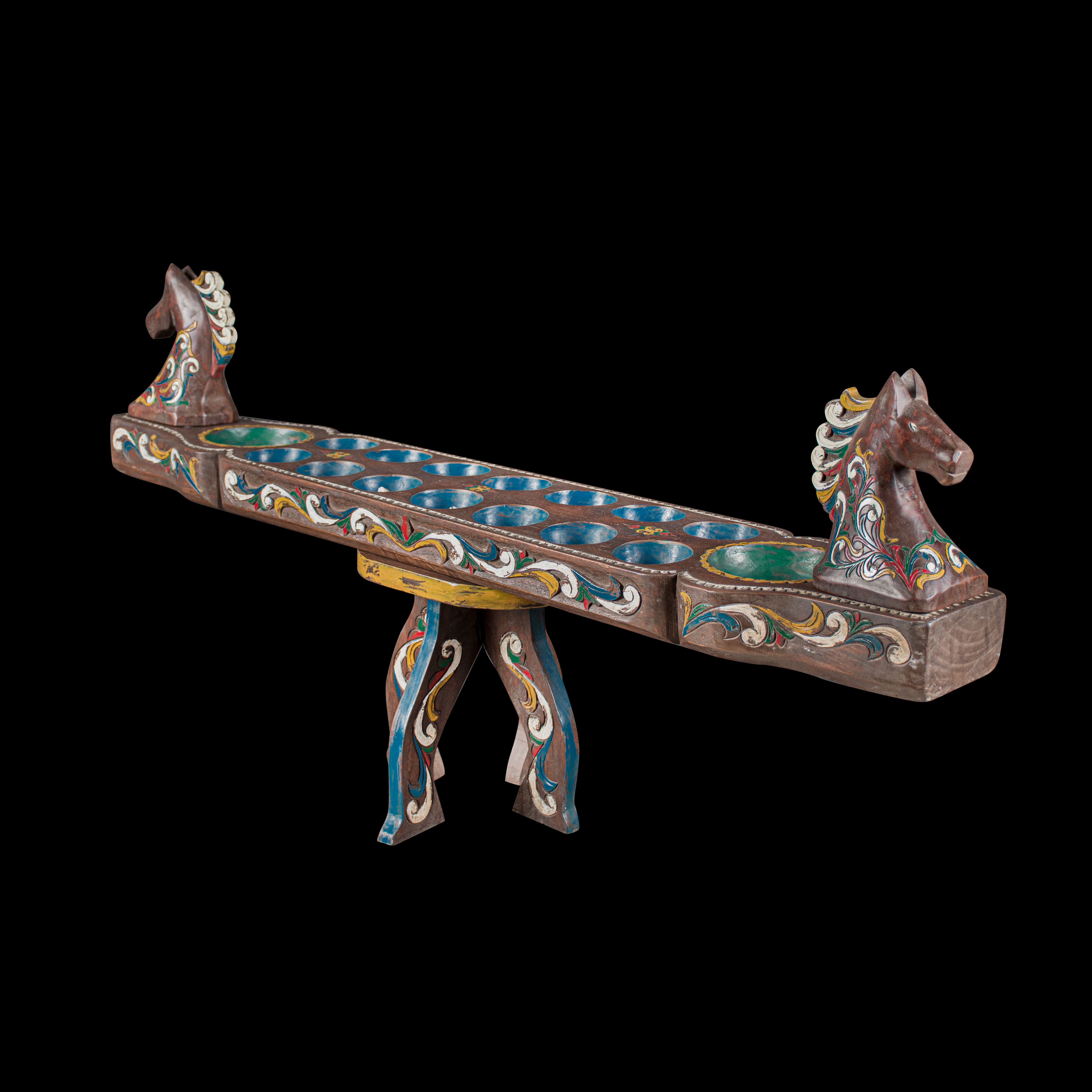 - A finely carved game board/Sungka with cowrie shells