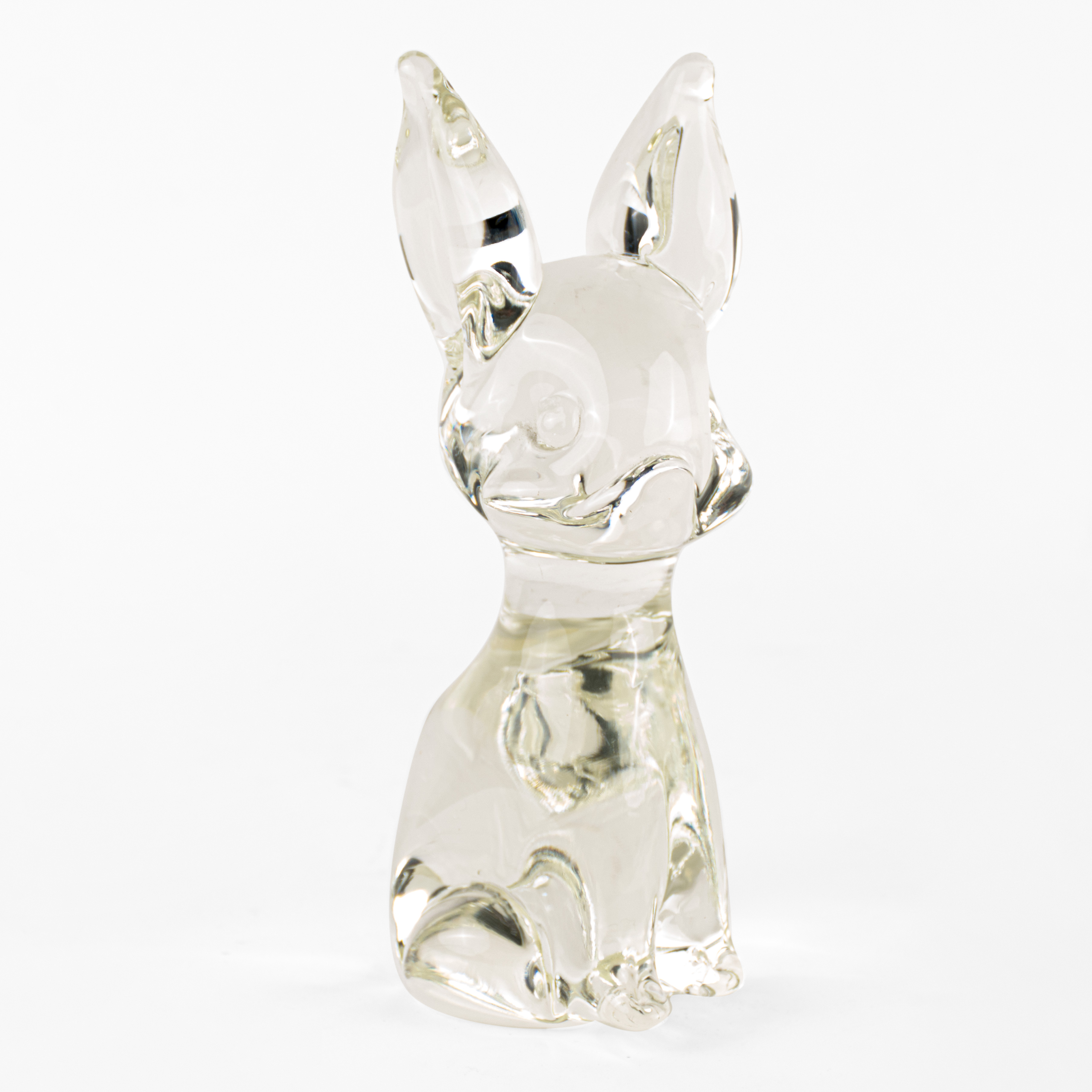 - A glass fawn figurine
