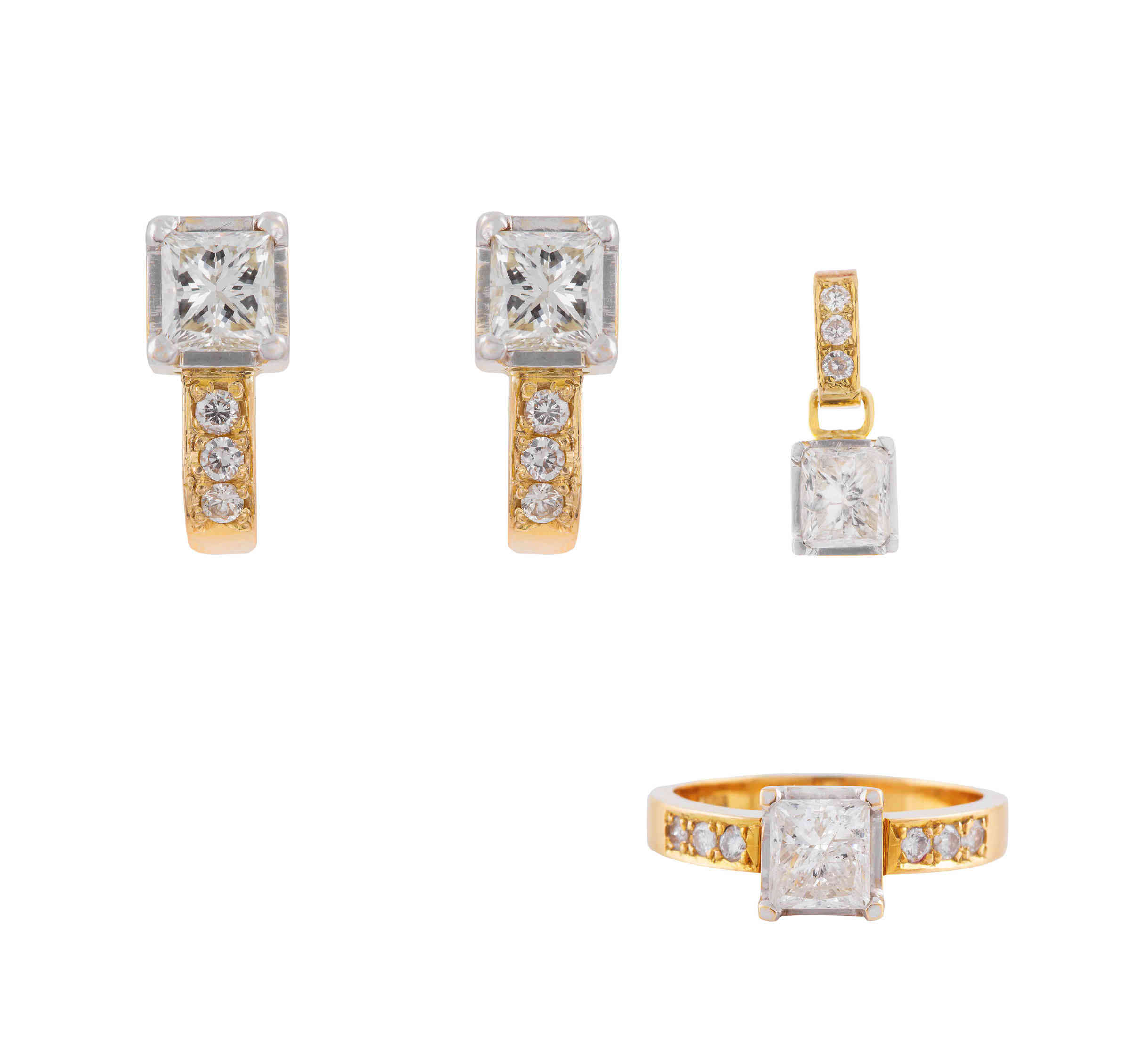 A radiant cut diamond and diamond melee parure, set in 14k yellow gold ...