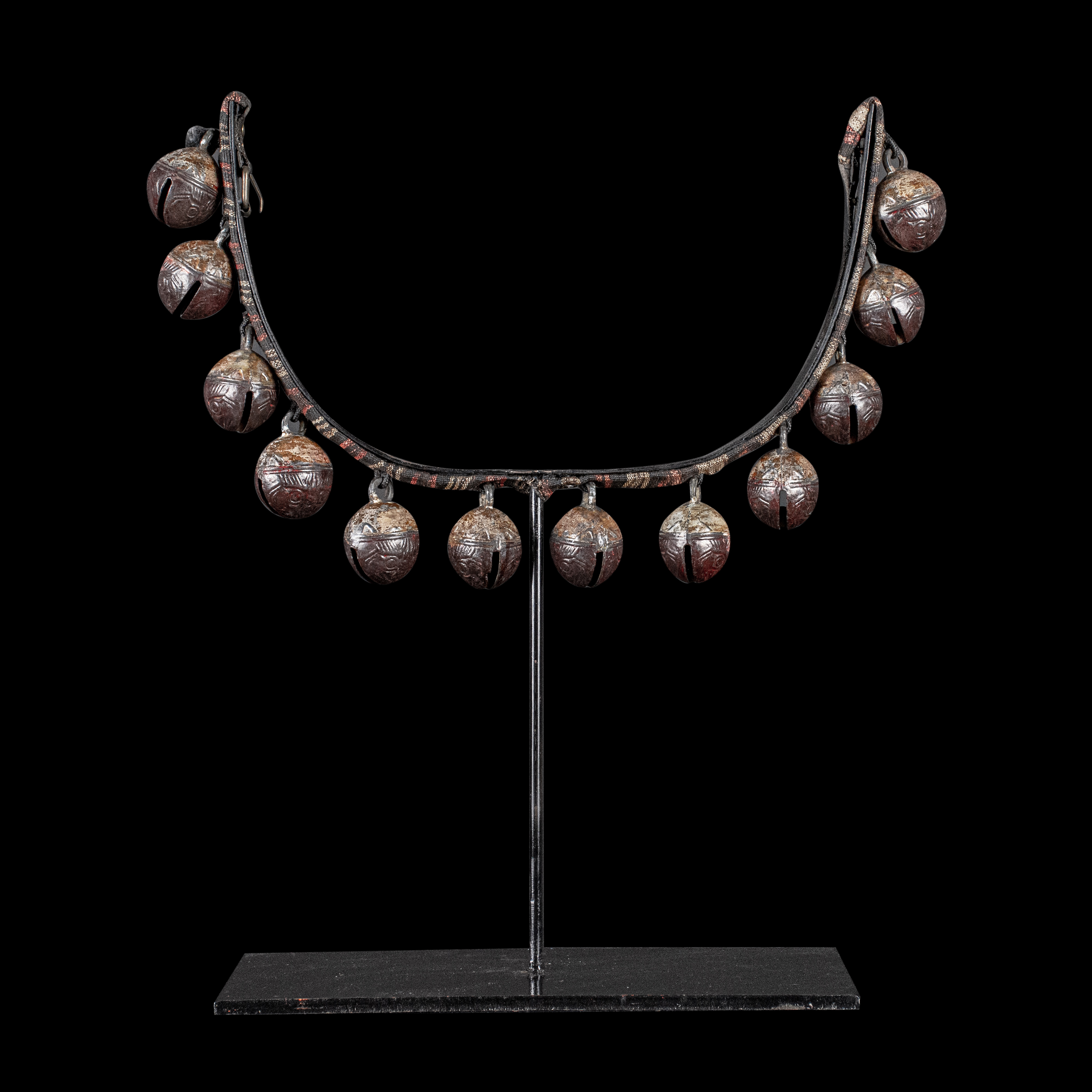 - A Tongkaling / An equestrian neckpiece with antique bronze bells