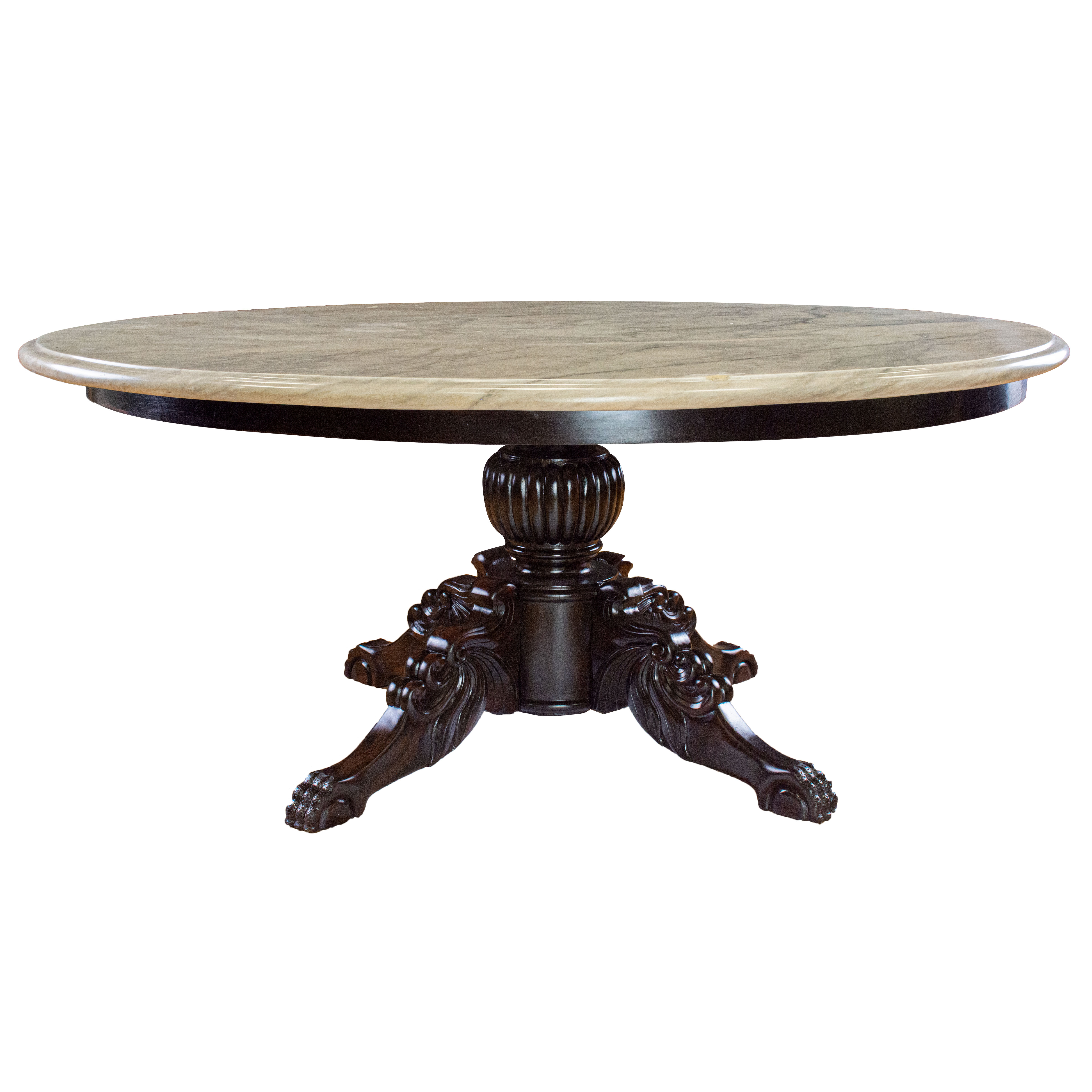 - A huge marble top round dining table by Osmundo Esguerra