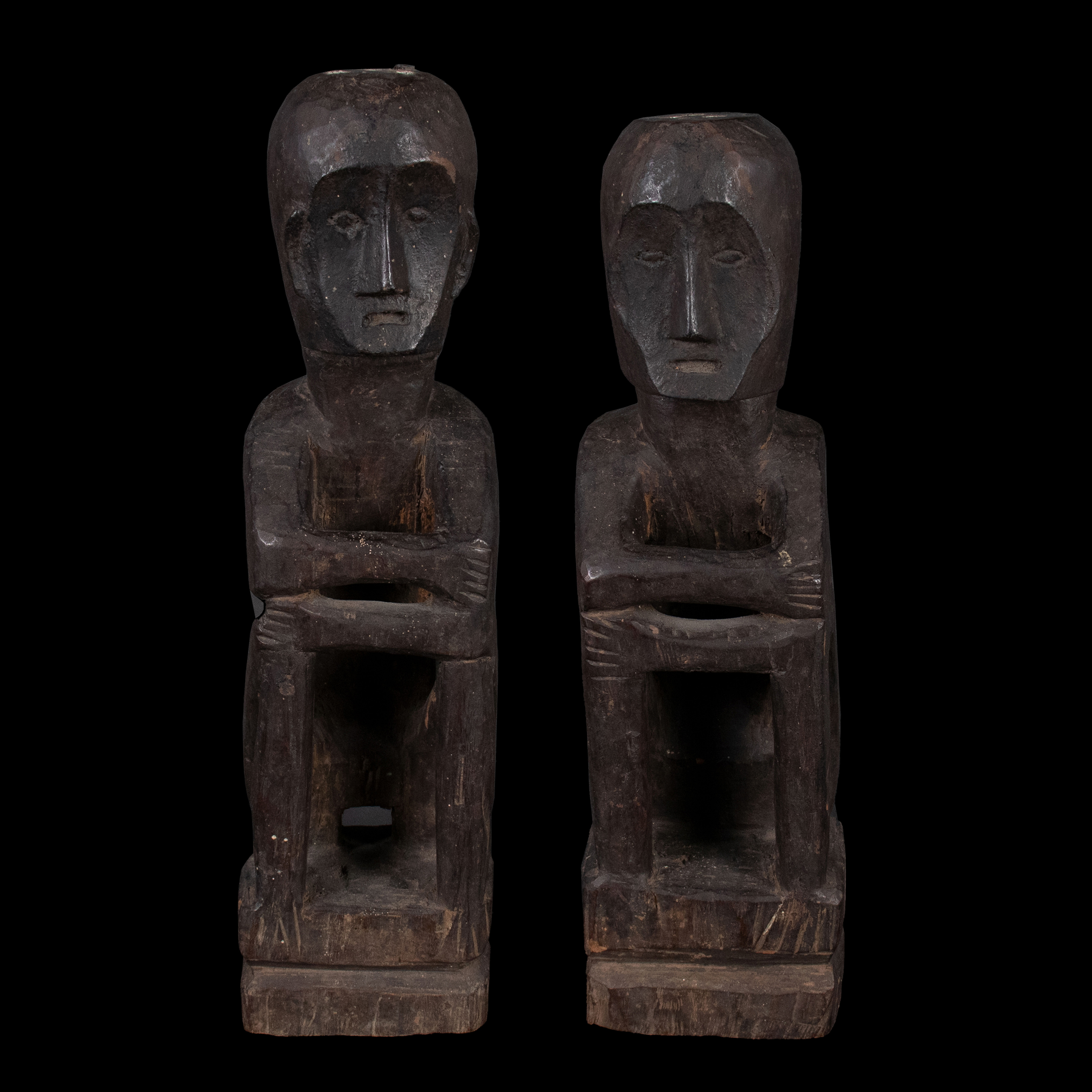 - A pair of seated Bululs