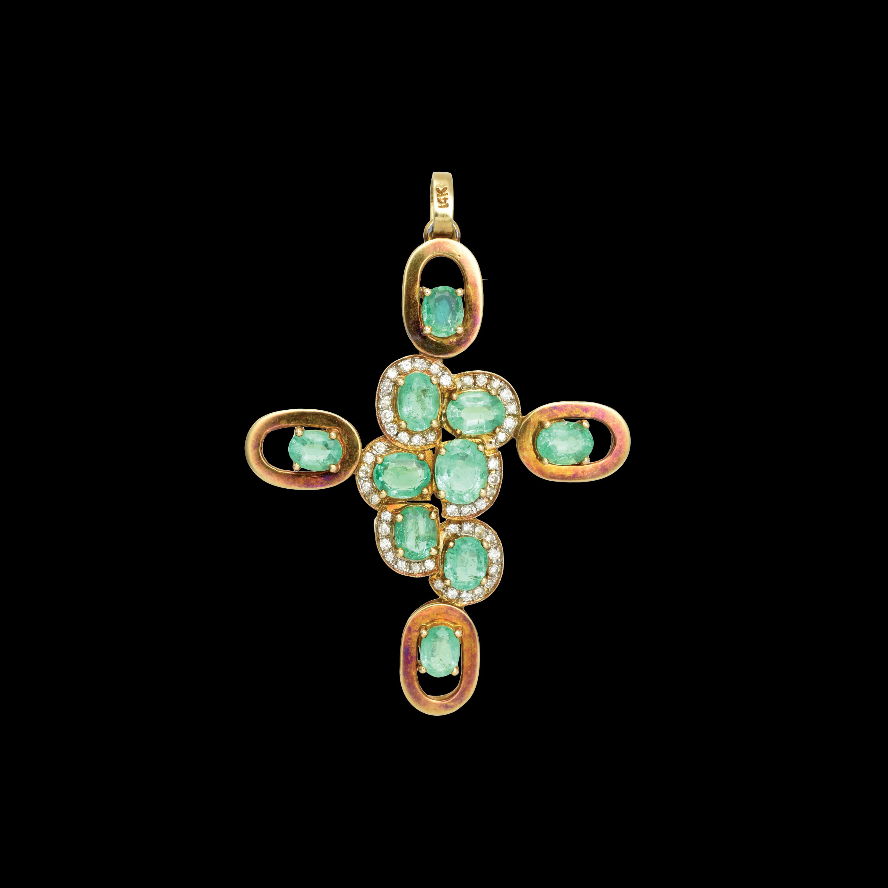 - A colombian emerald cross pendant