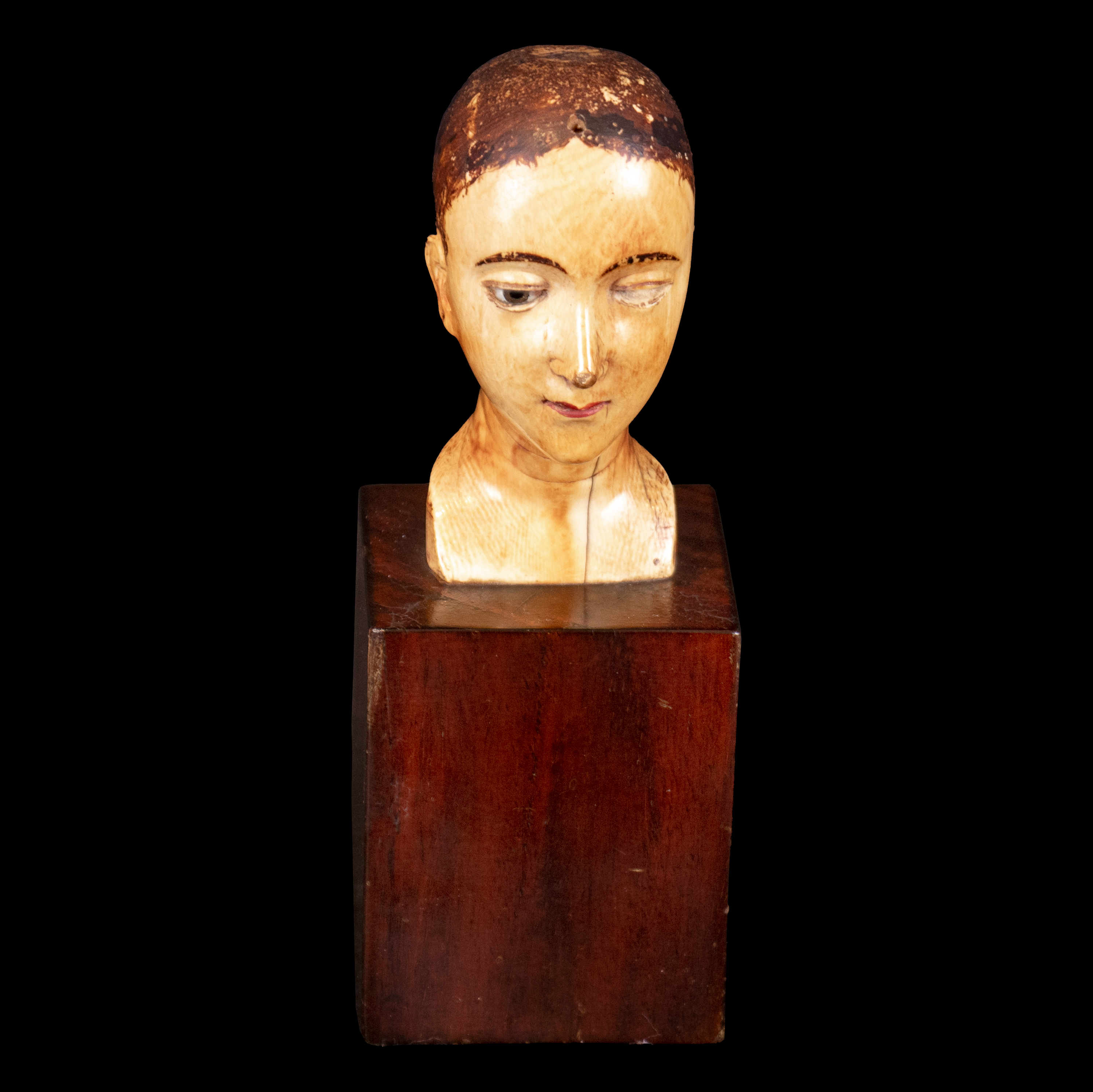 - An ivory head of a female saint