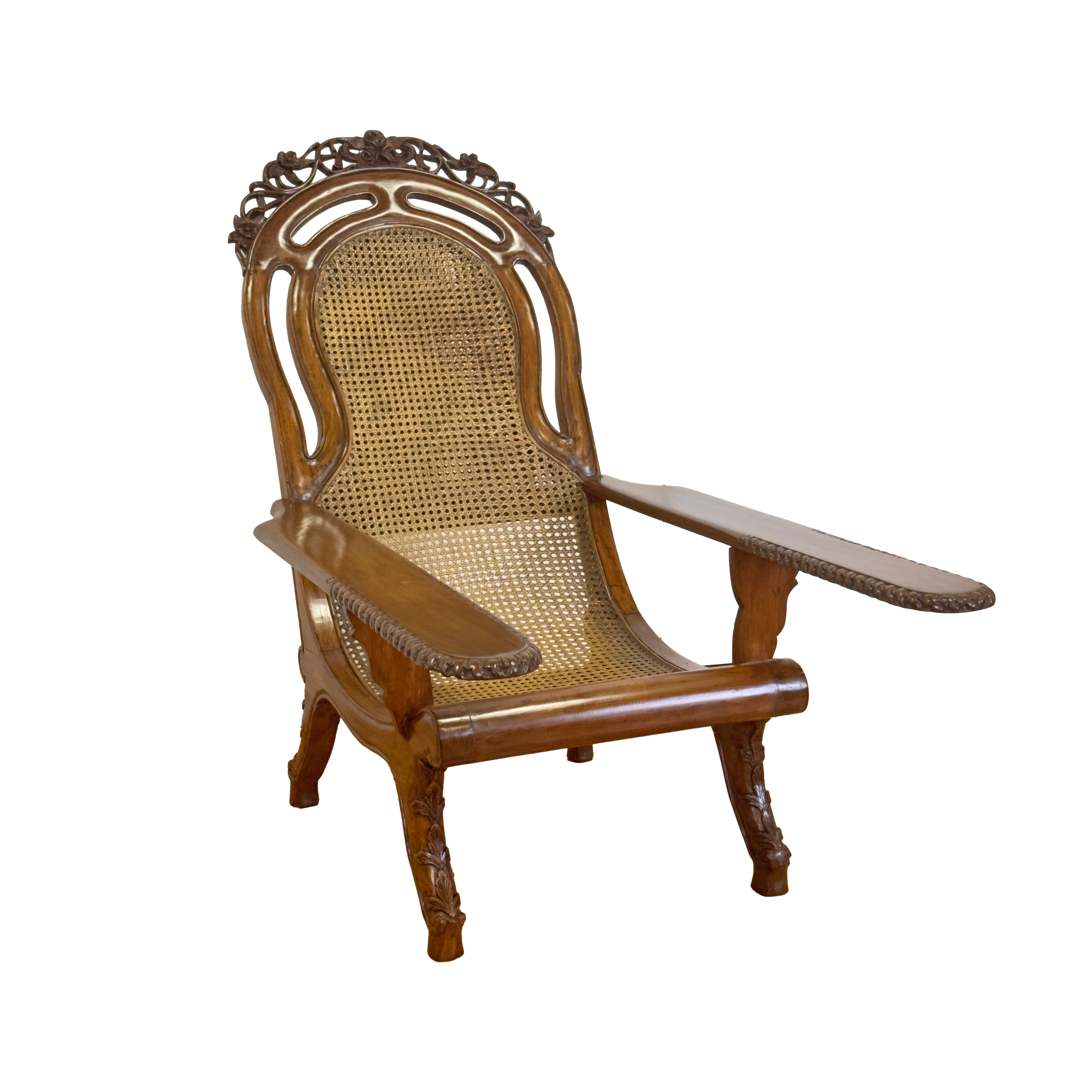 - A butaca chair with pierce carved back and gadrooned arms