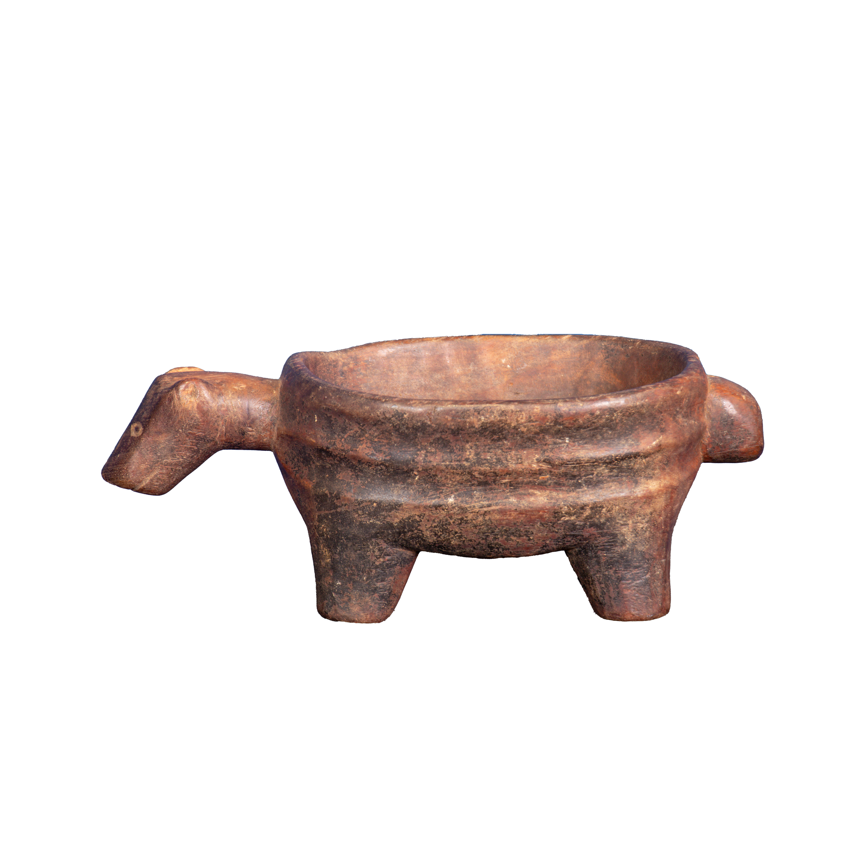 - An elegant fluted Ifugao kinahu bowl in the shape of a dog